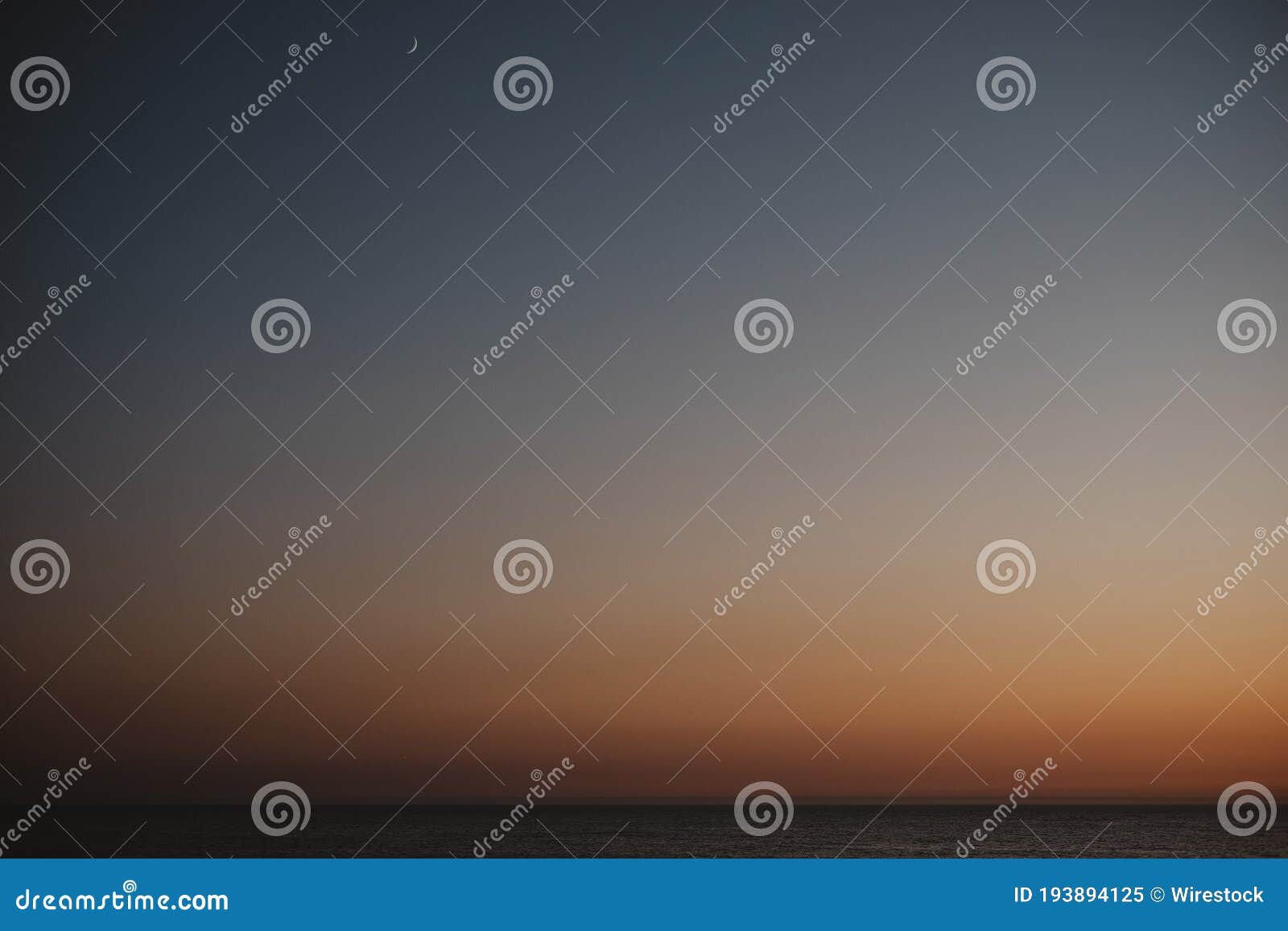 Beautiful Shot of a Twilight Gradient Sky with a Crescent Moon Above ...