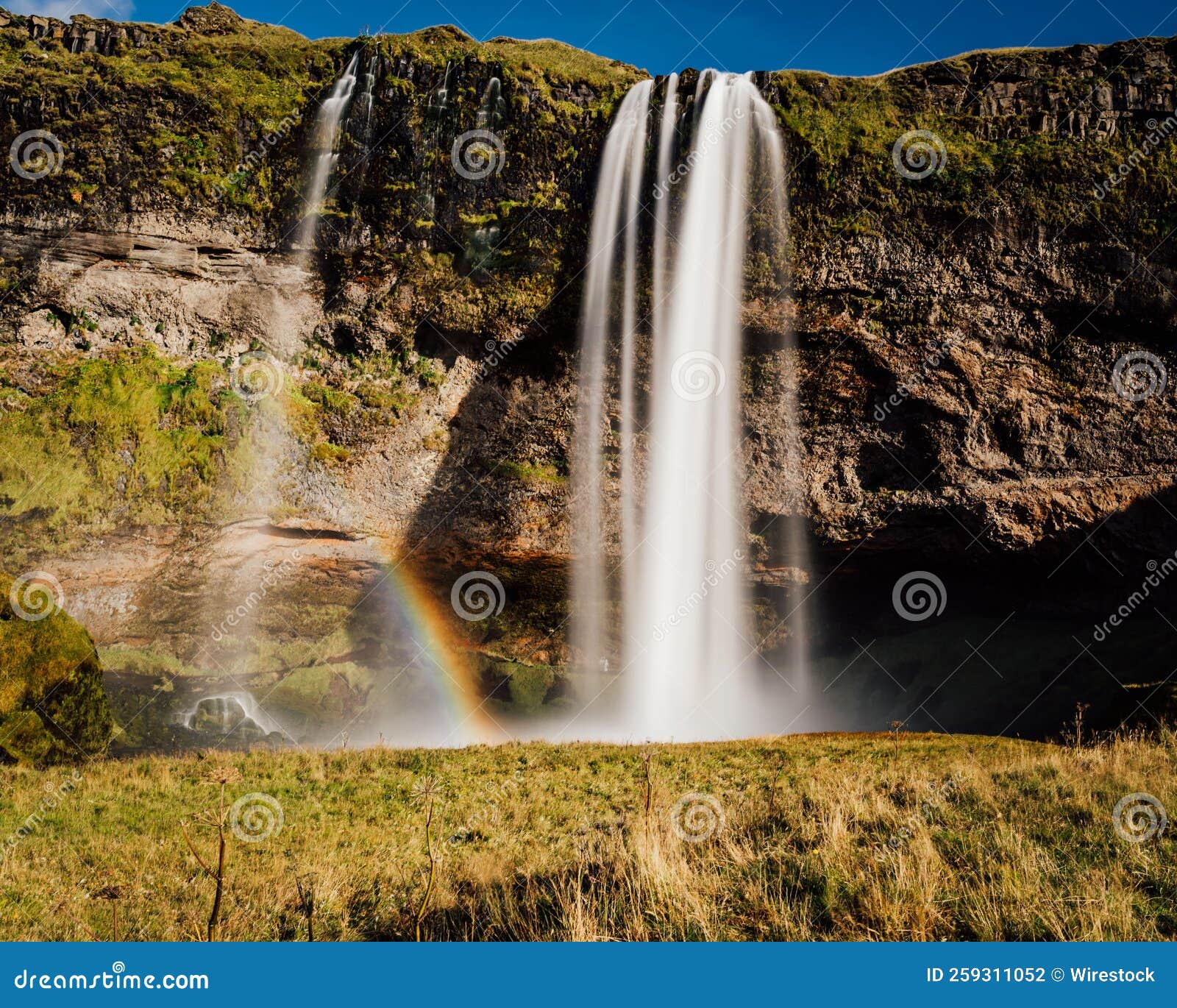 Beautiful Shot of a Waterfall Flowing Down from Cliffs Stock Photo ...