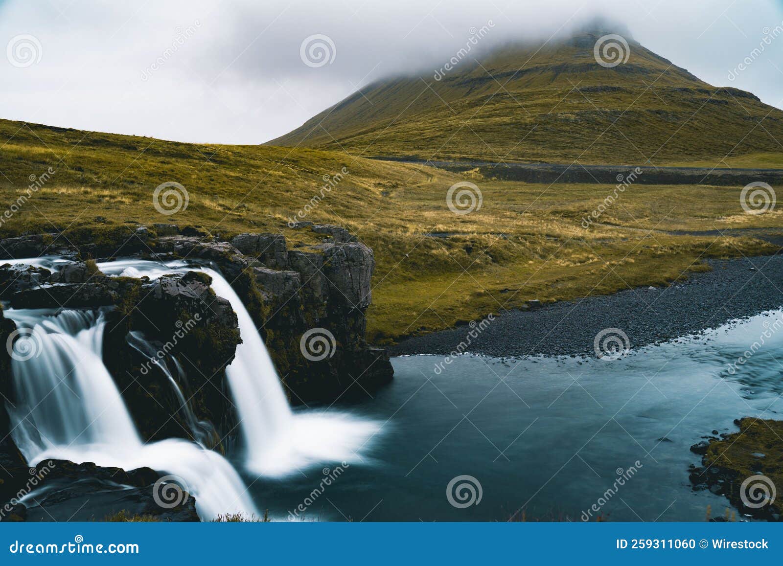 Beautiful Shot of a Waterfall Flowing Down from Cliffs Stock Photo ...