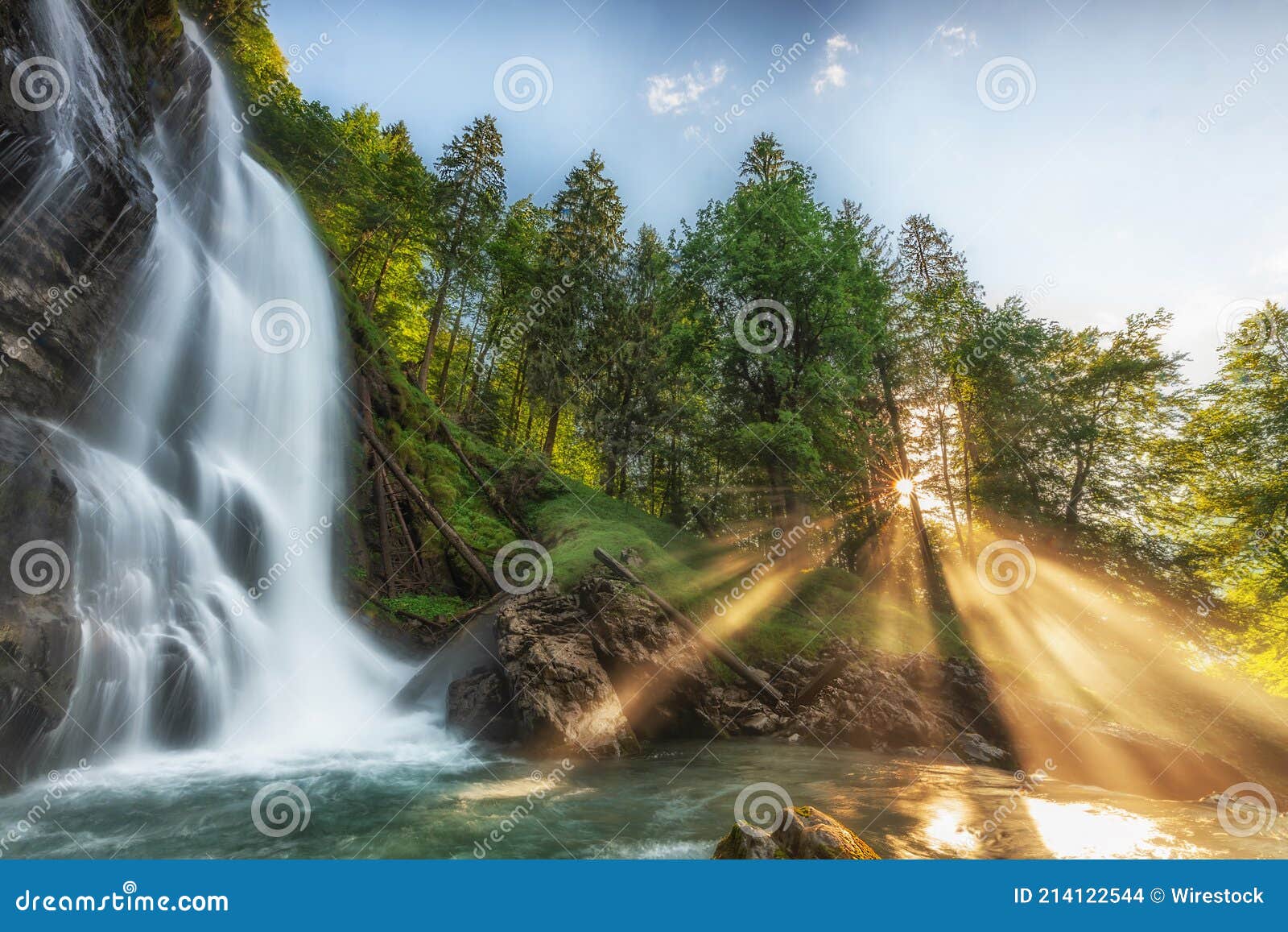 Beautiful Shot of a Waterfall in the Forest on a Sunny Day Stock Photo ...