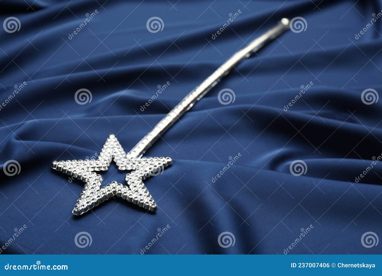 Beautiful Silver Magic Wand on Blue Fabric Stock Photo - Image of ...