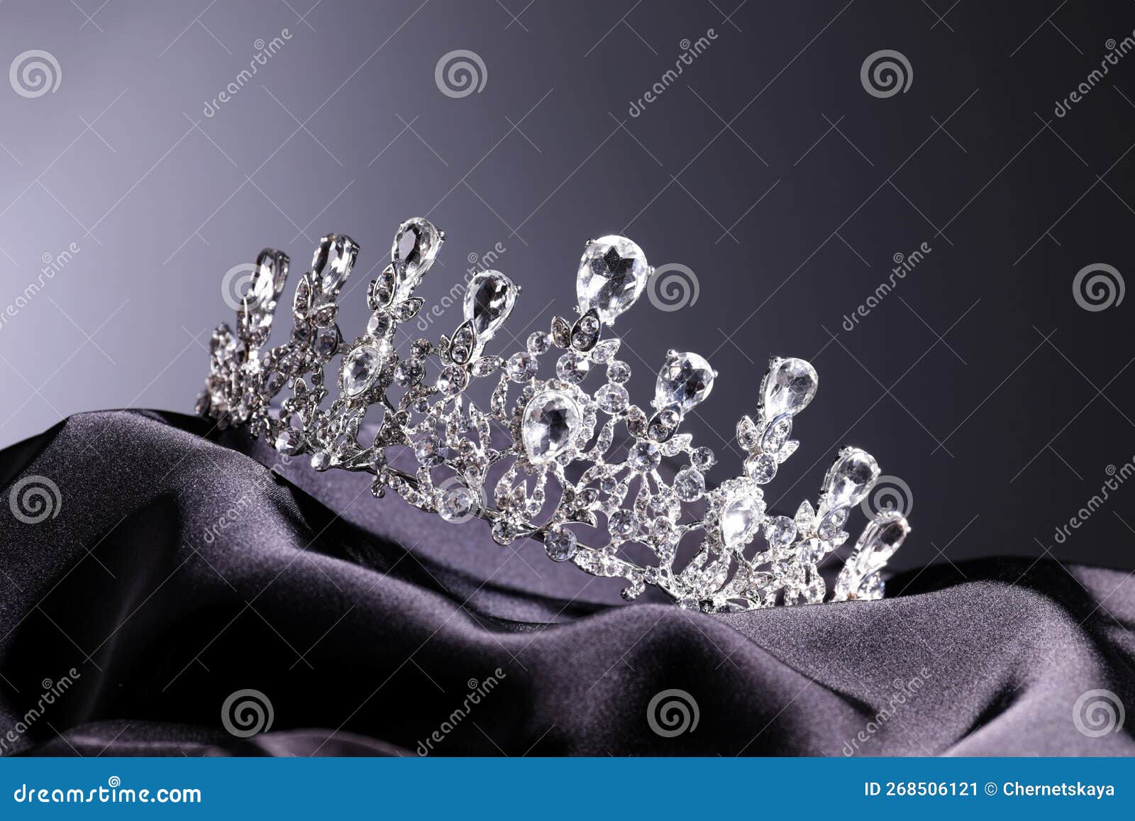 Beautiful Silver Tiara with Diamonds on Dark Cloth Against Grey ...