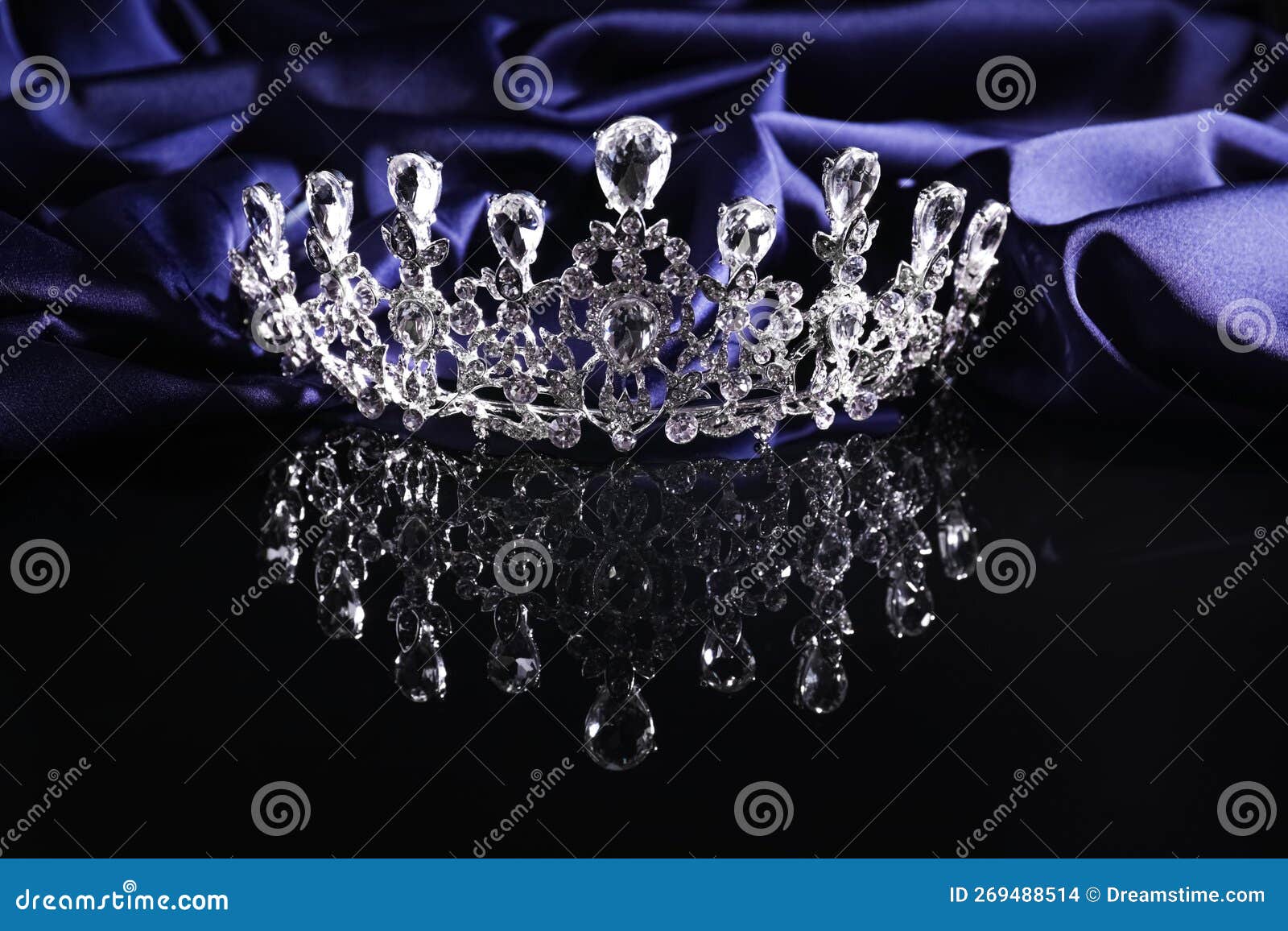 Beautiful Silver Tiara with Diamonds on Dark Mirror Surface Stock Photo ...