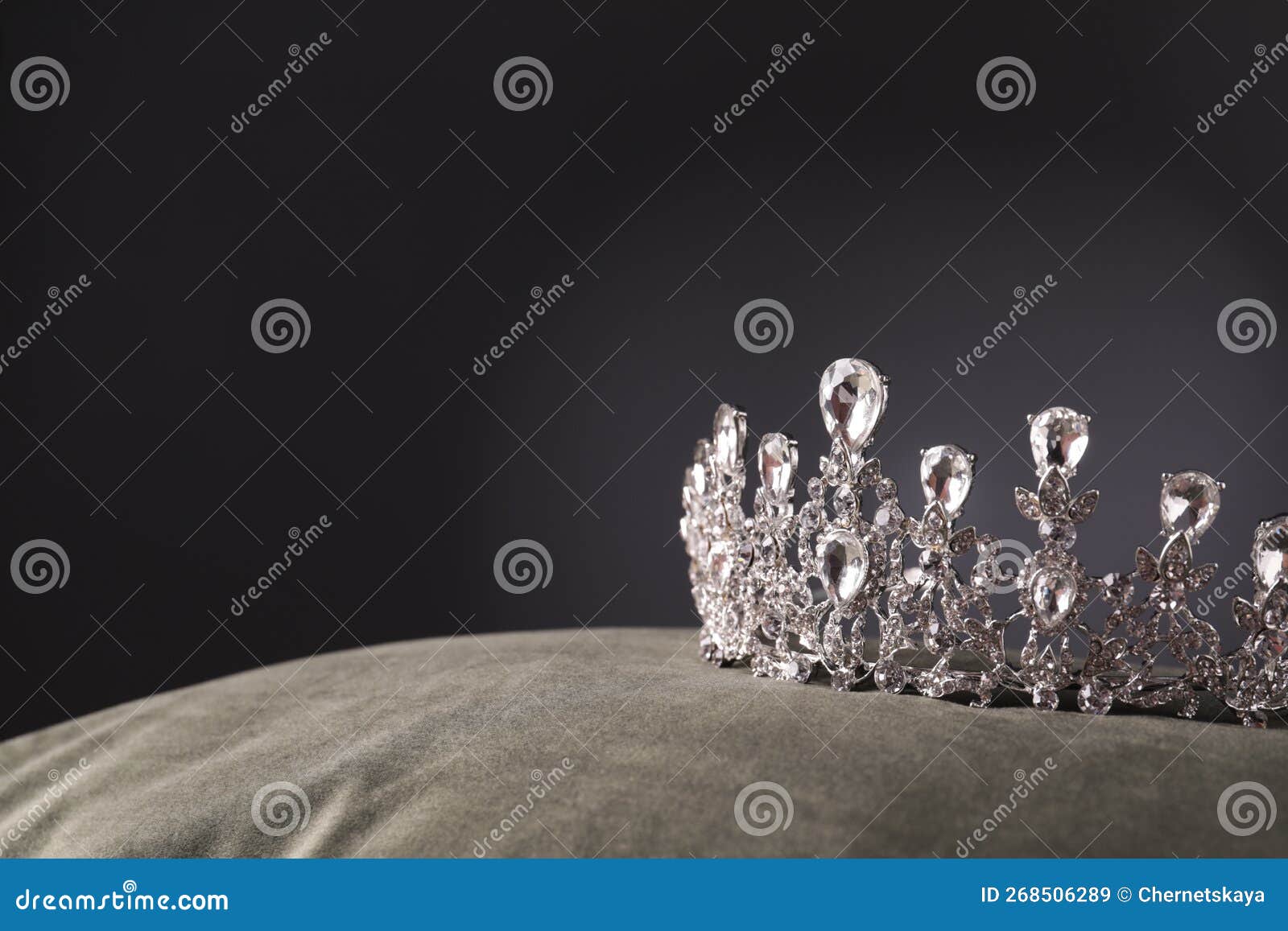 Beautiful Silver Tiara with Diamonds on Grey Cloth. Space for Text ...
