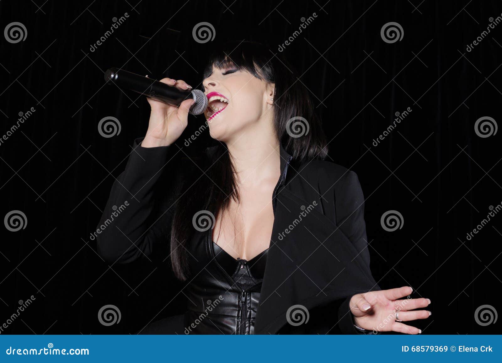 Beautiful singer singing stock image. Image of brunette - 68579369