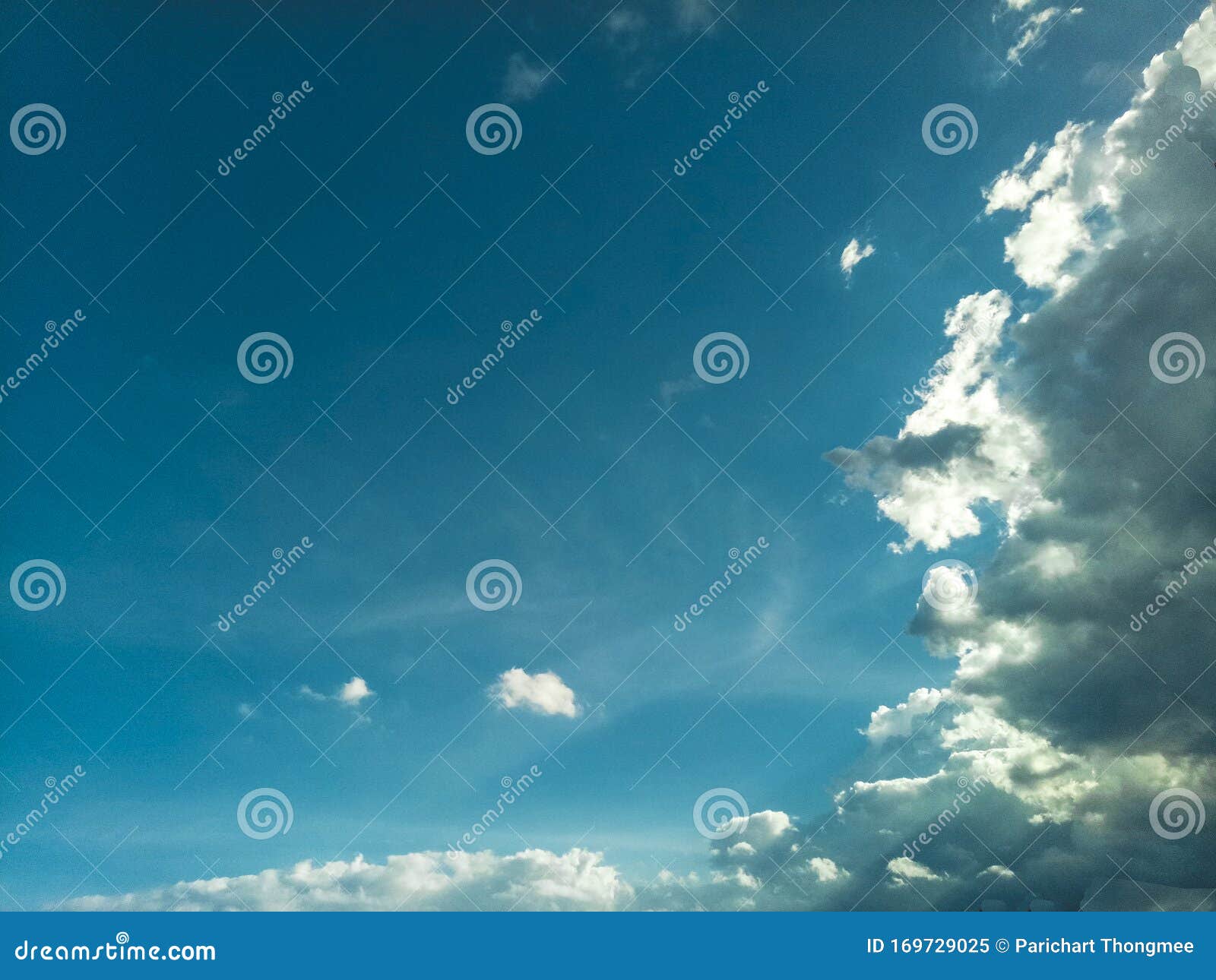 Beautiful Sky Cloudscape .rim Light Behind Dark Cloud with Blue Sky ...