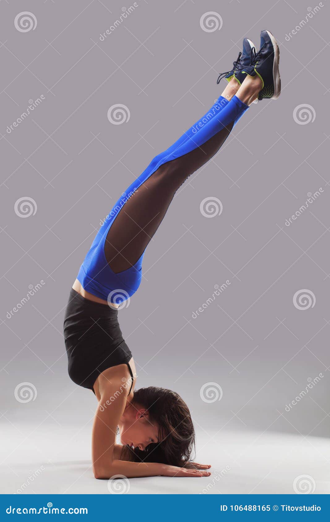 Slender Athlete Performs Exercises in the Studio Stock Image - Image of ...