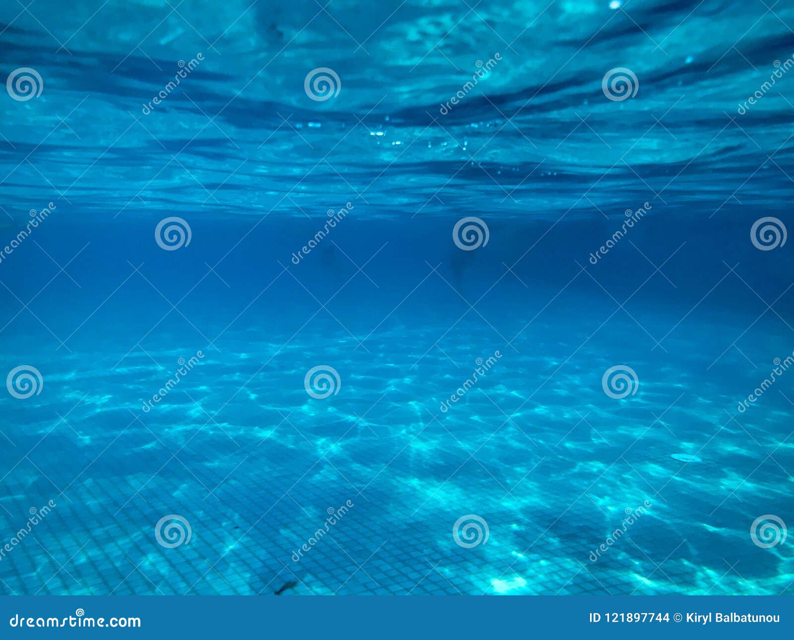 A Beautiful Slender Girl With Her Back In A Red Swimsuit Swims Bathes In The Water Of A