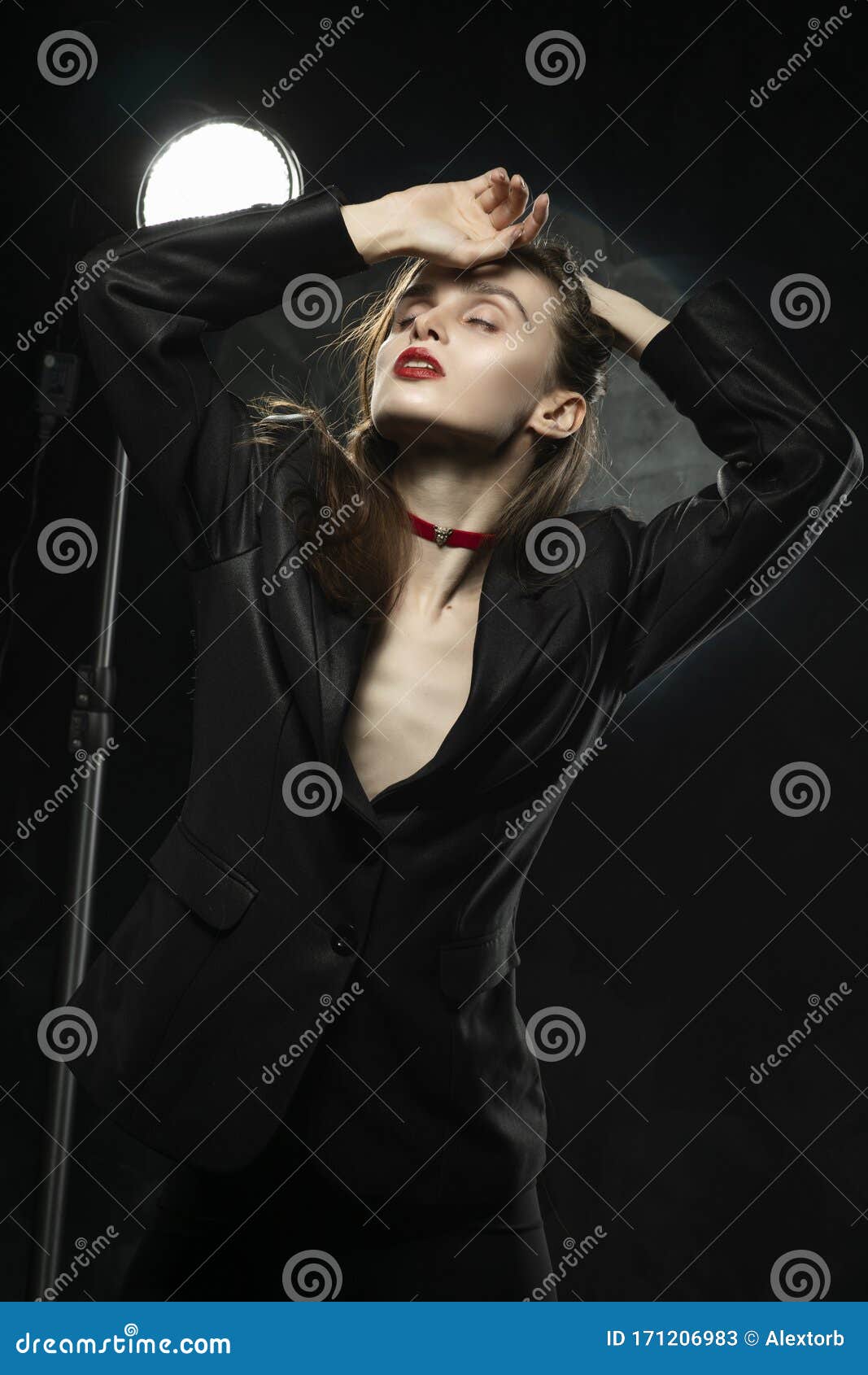 Beautiful Slim Braless Girl Wearing A Unbuttoned Black Blazer