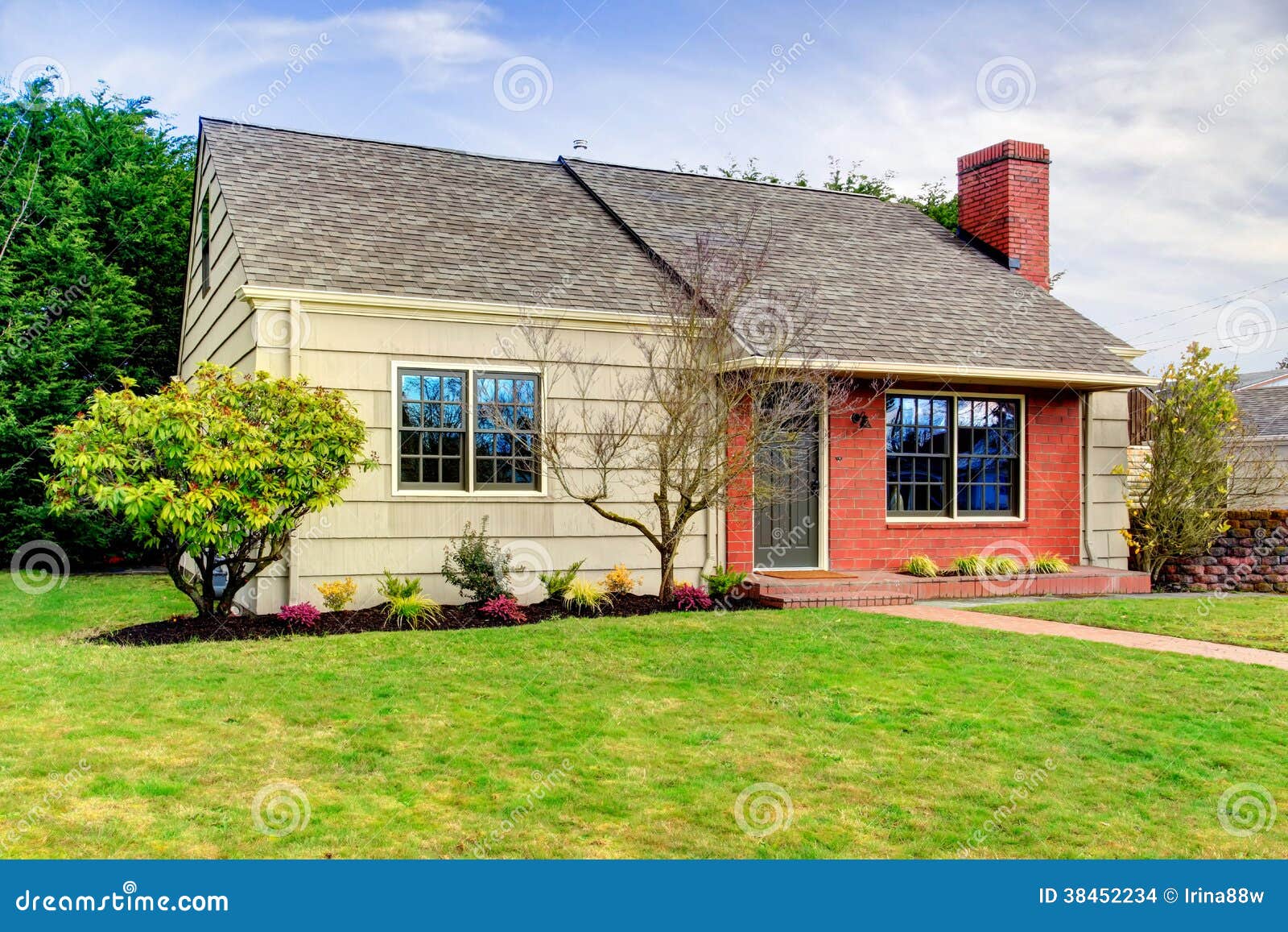 Beautiful Small Siding House with a Brick Trim Wall Stock Photo - Image ...