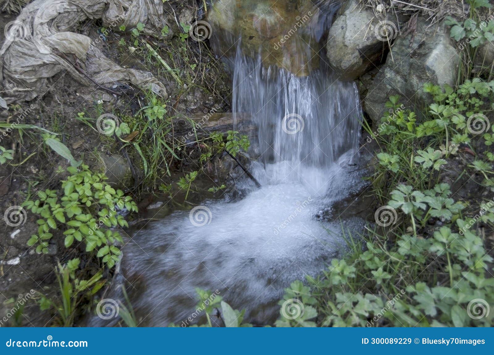 Beautiful Small Waterfall in the Forest Polluted with Plastic Bags and ...