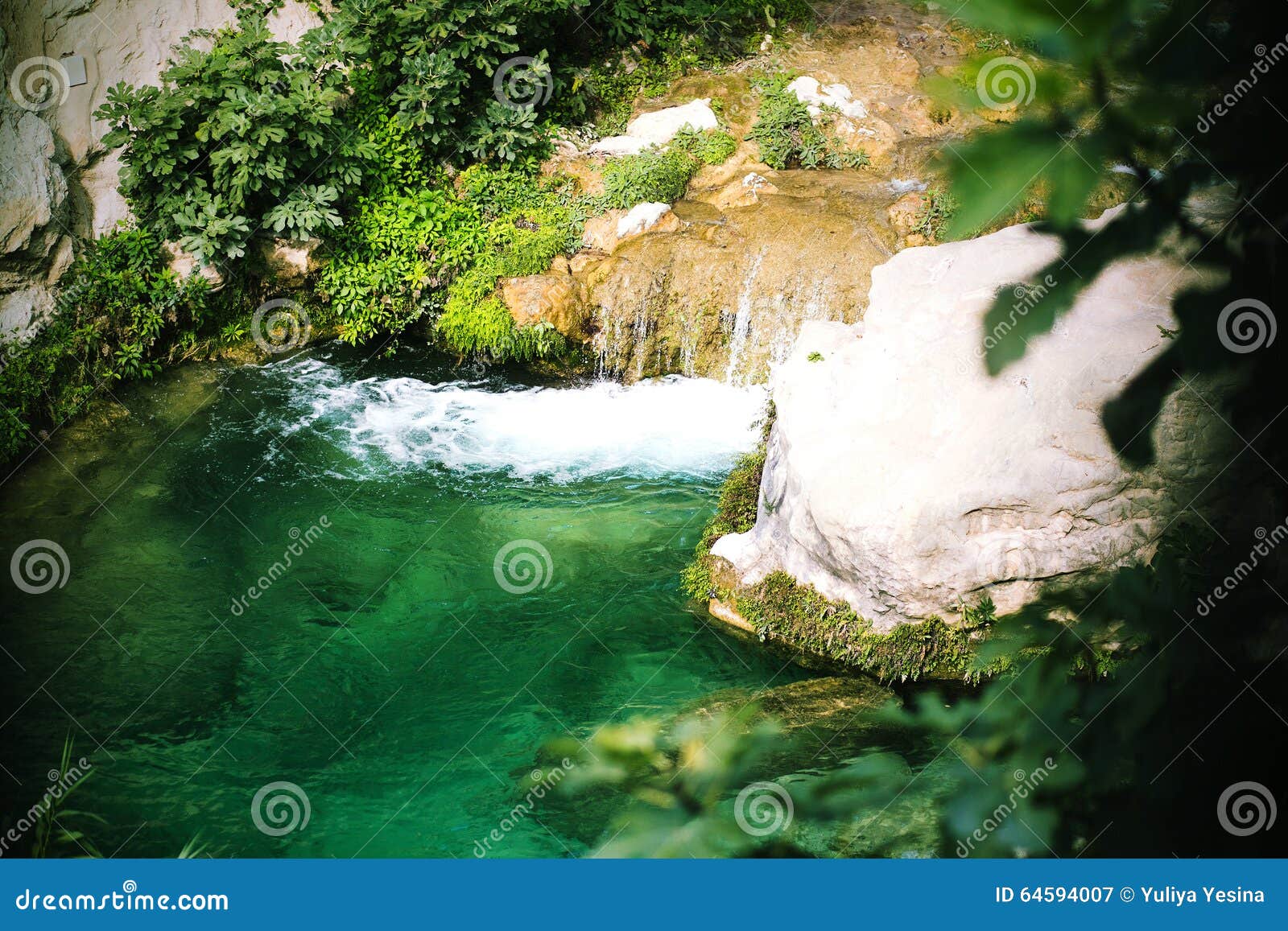 Beautiful small waterfall stock image. Image of nature - 64594007