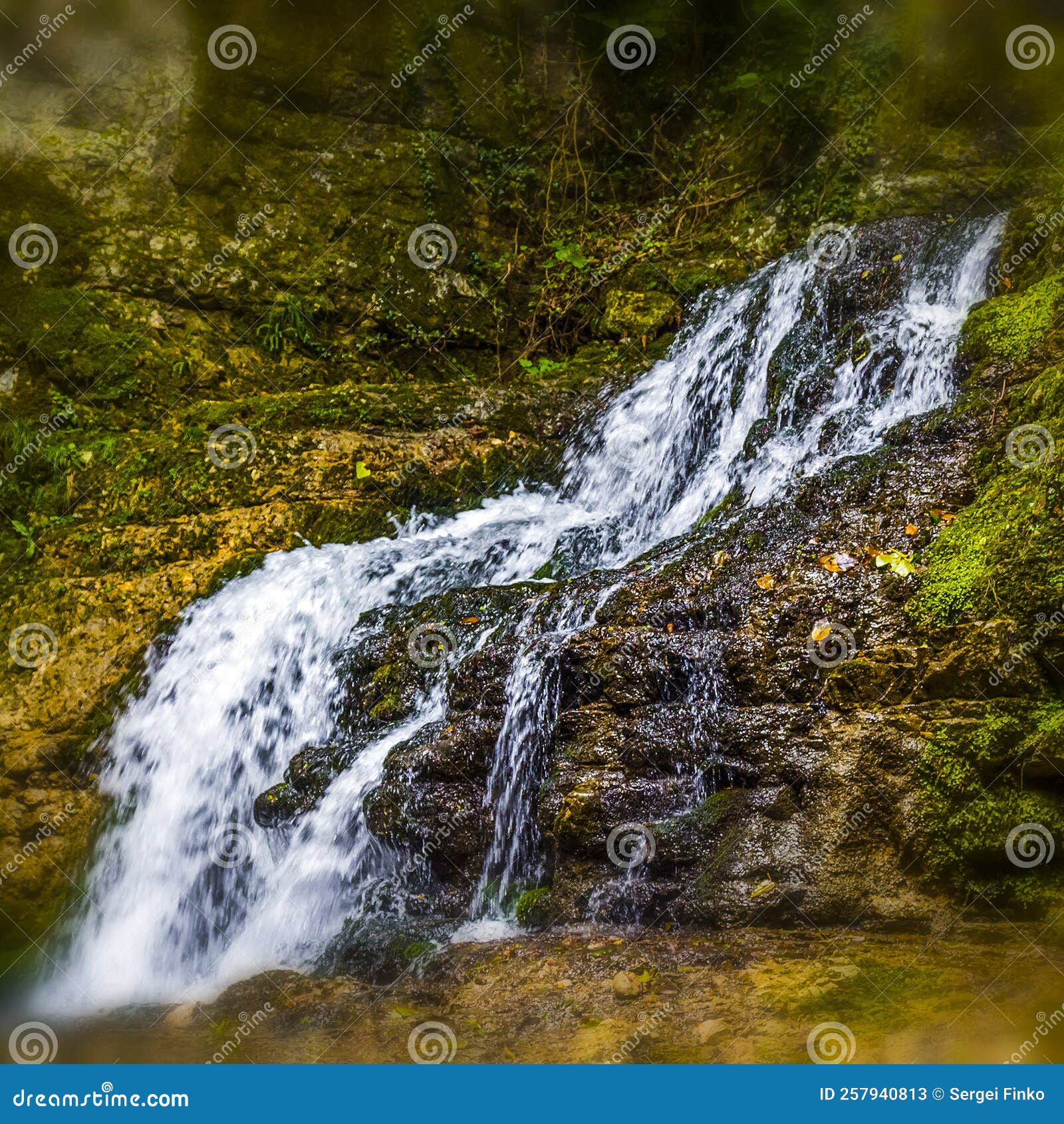 Beautiful small waterfall stock image. Image of nature - 257940813