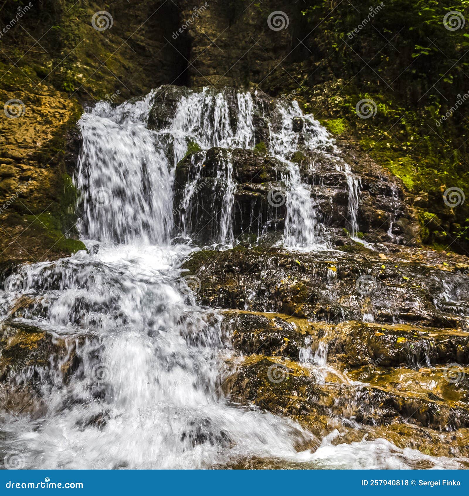 Beautiful small waterfall stock photo. Image of nature - 257940818