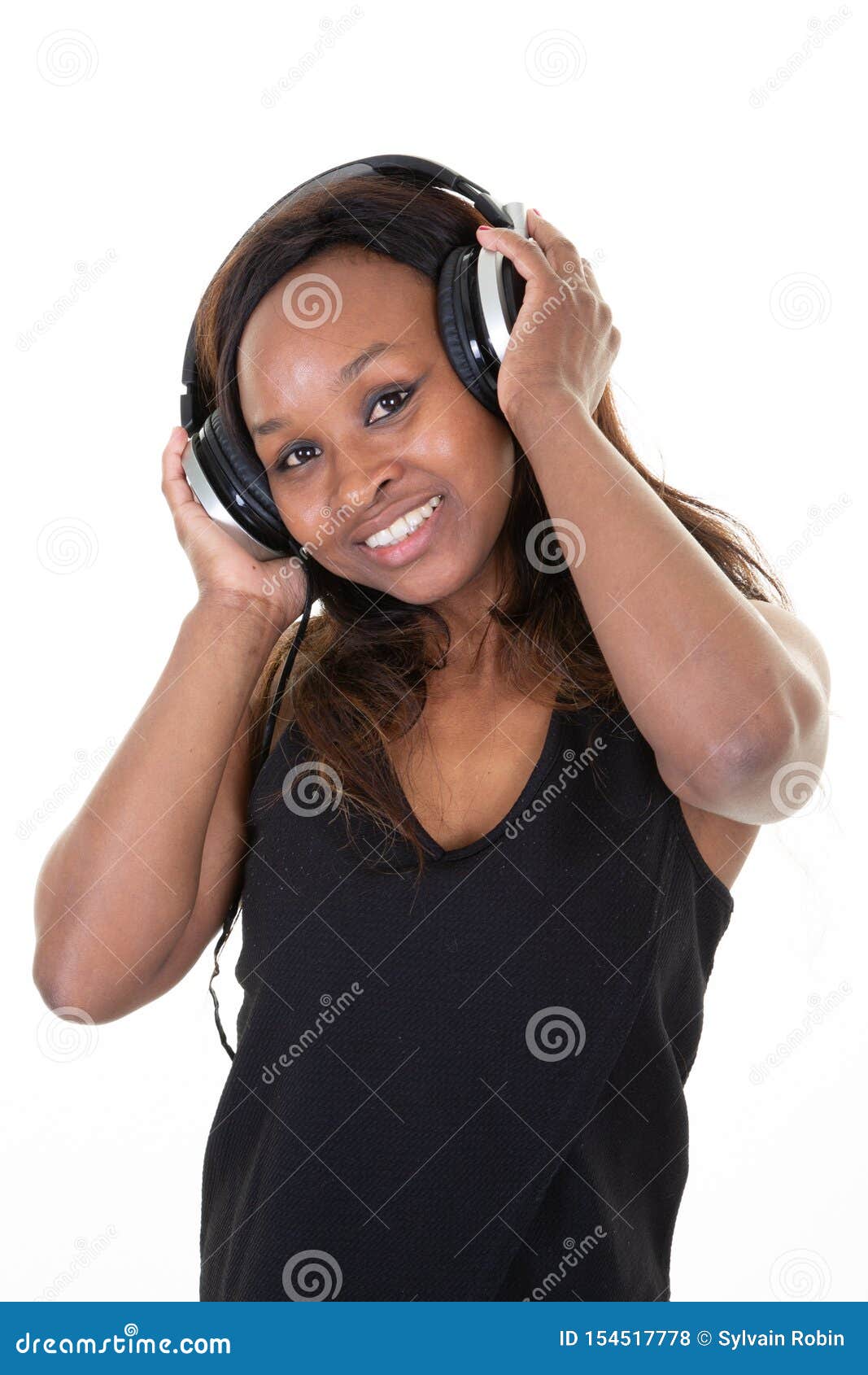 Beautiful Smiling American African Woman With Headphones Enjoying