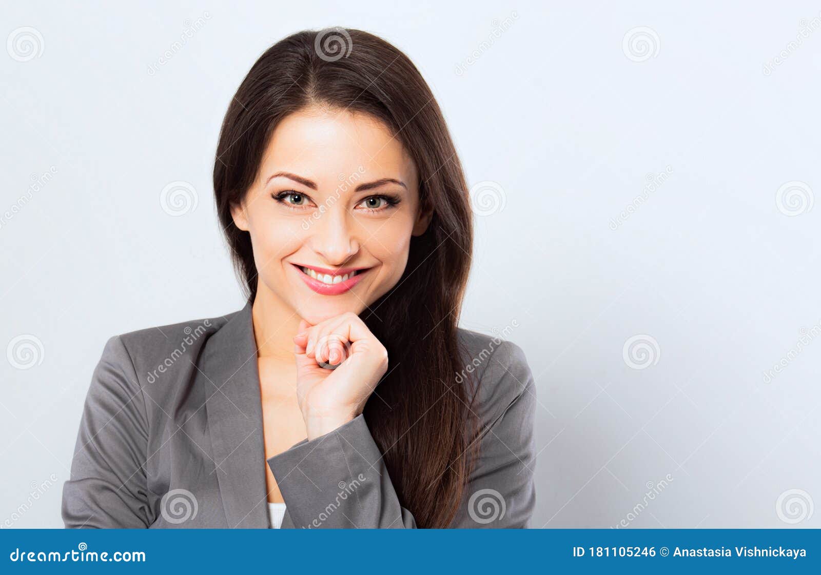 Beautiful Smiling Business Woman in Suit Holding the Hands Under the ... Beautiful Smiling Business Woman in Suit Holding the Hands Under the ...