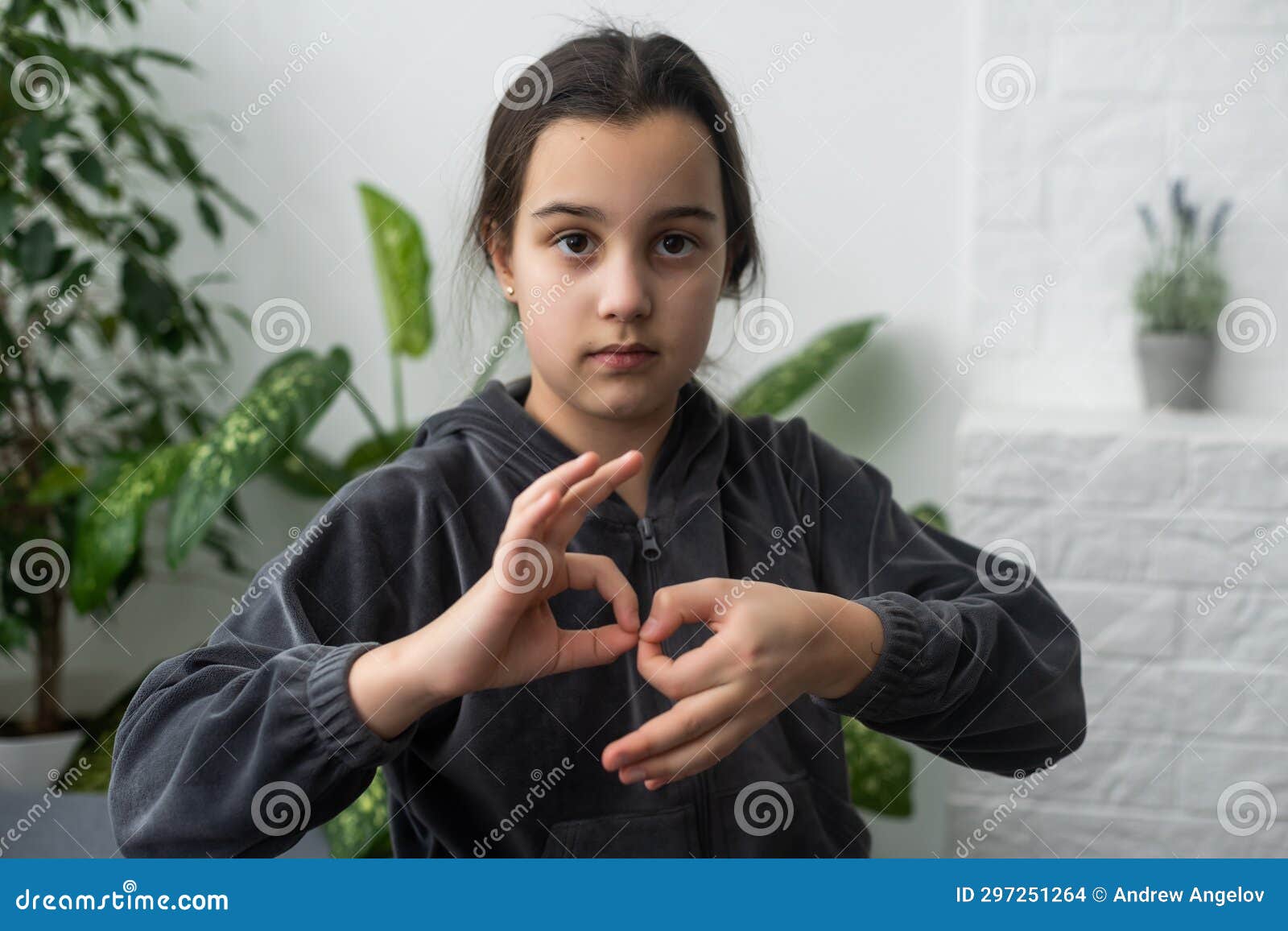 Beautiful Smiling Deaf Girl Using Sign Language. Stock Photo - Image of ...