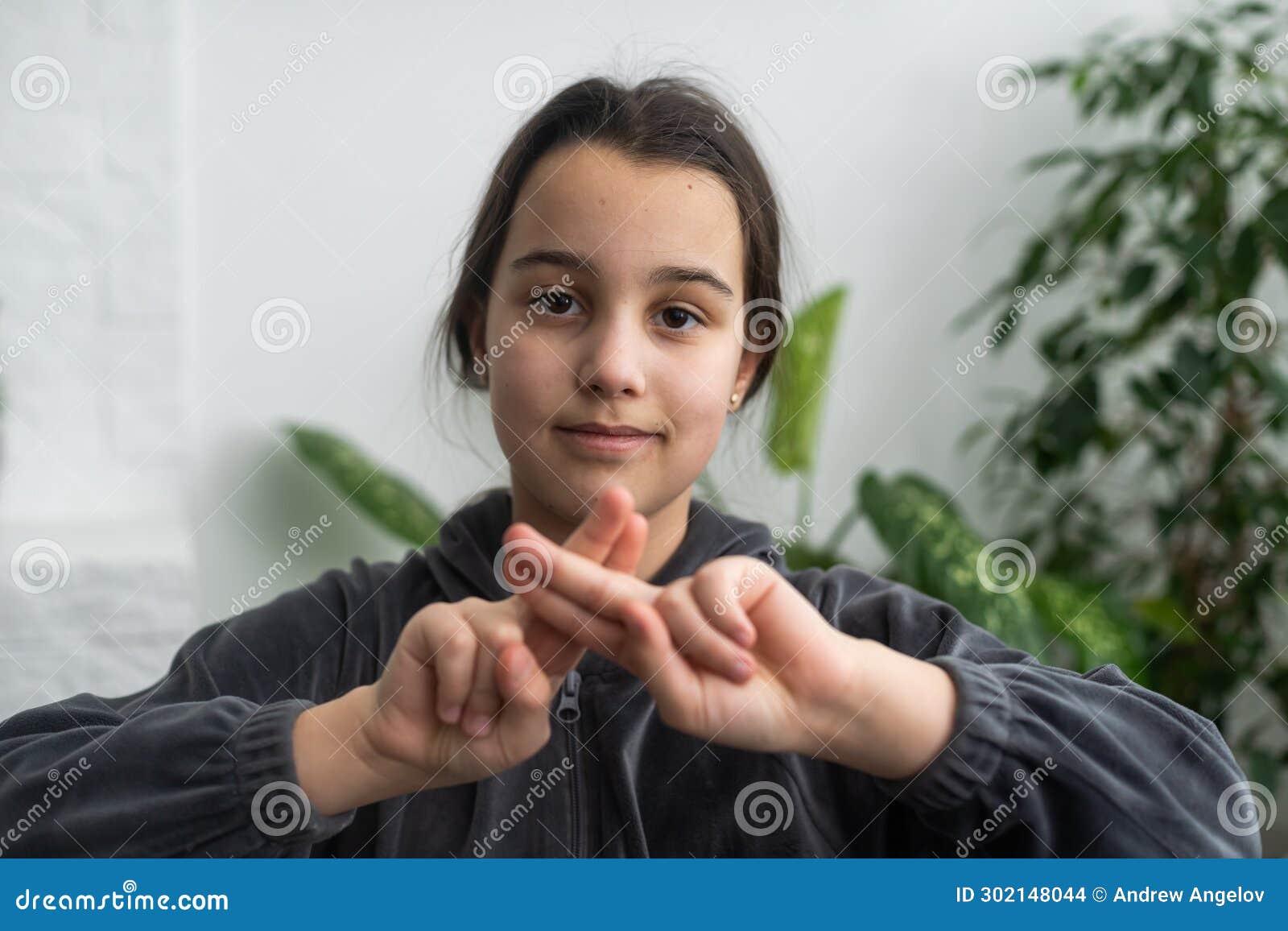 Beautiful Smiling Deaf Girl Using Sign Language. Stock Photo - Image of ...