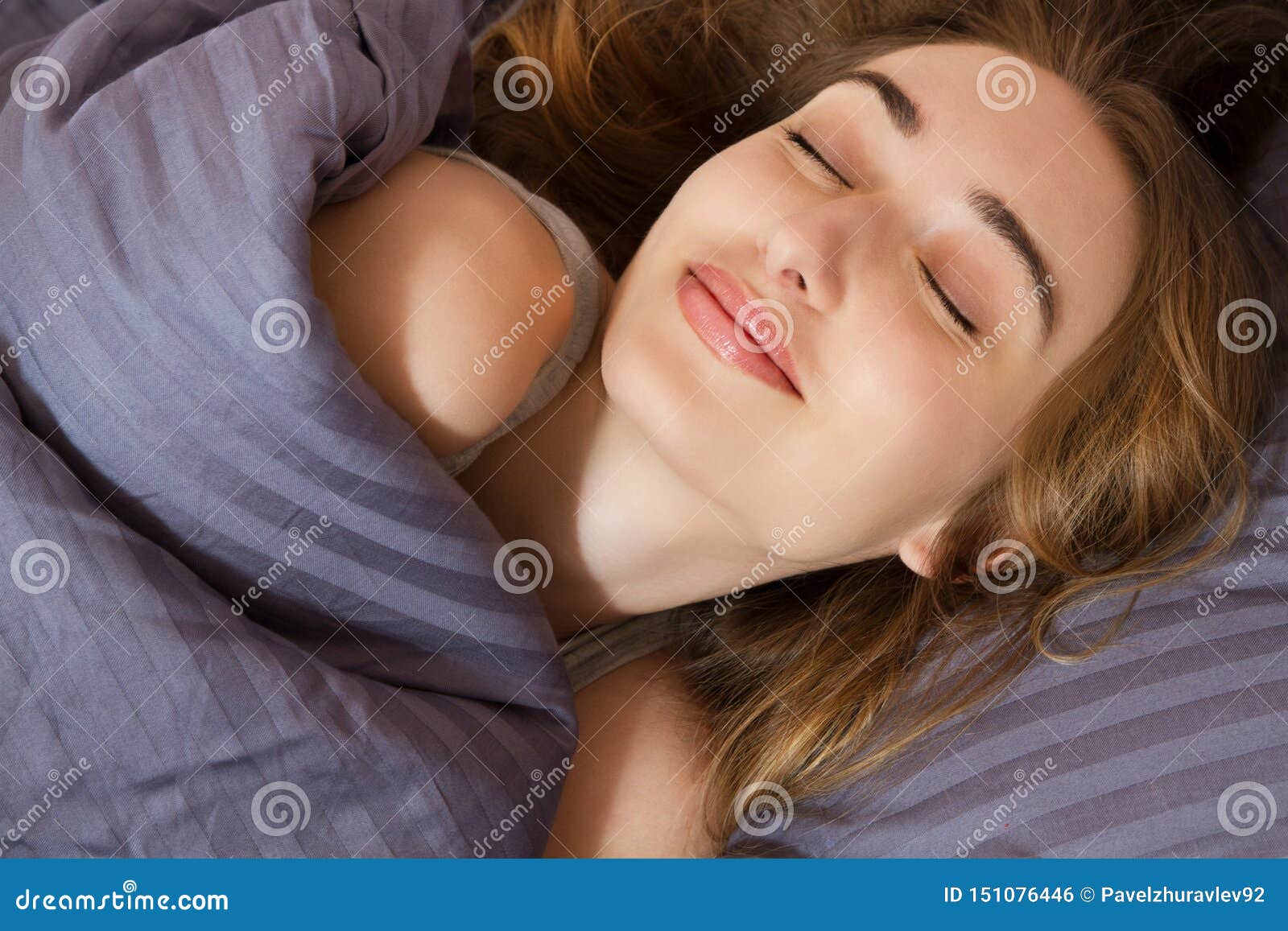Beautiful Smiling Face of a Young Woman Sleeping in Bed Close Up Stock ... Beautiful Smiling Face of a Young Woman Sleeping in Bed Close Up Stock ...