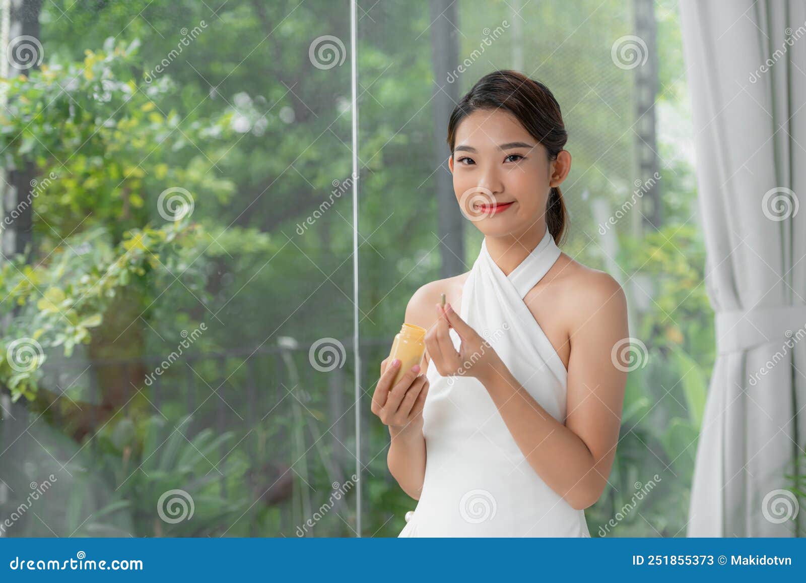 Beautiful Smiling Girl Taking Medication, Holding Bottle with Pills in ... Beautiful Smiling Girl Taking Medication, Holding Bottle with Pills in ...