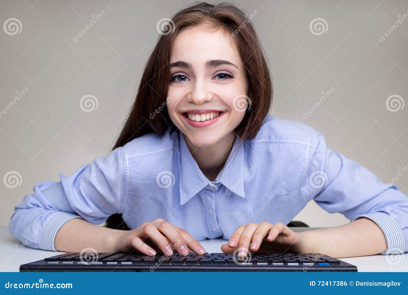 Beautiful Smiling Girl Using Keyboard Stock Photo - Image of adult ...