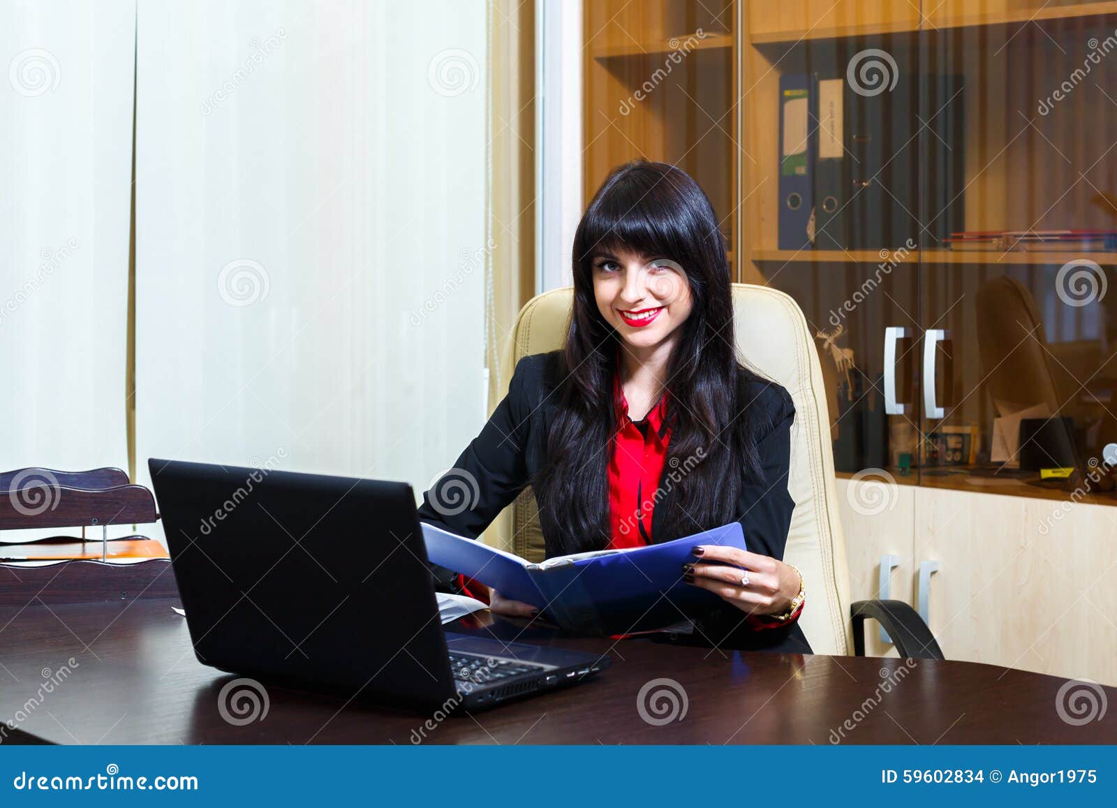 Beautiful Smiling Woman Working with Documents in Office Stock Photo ...