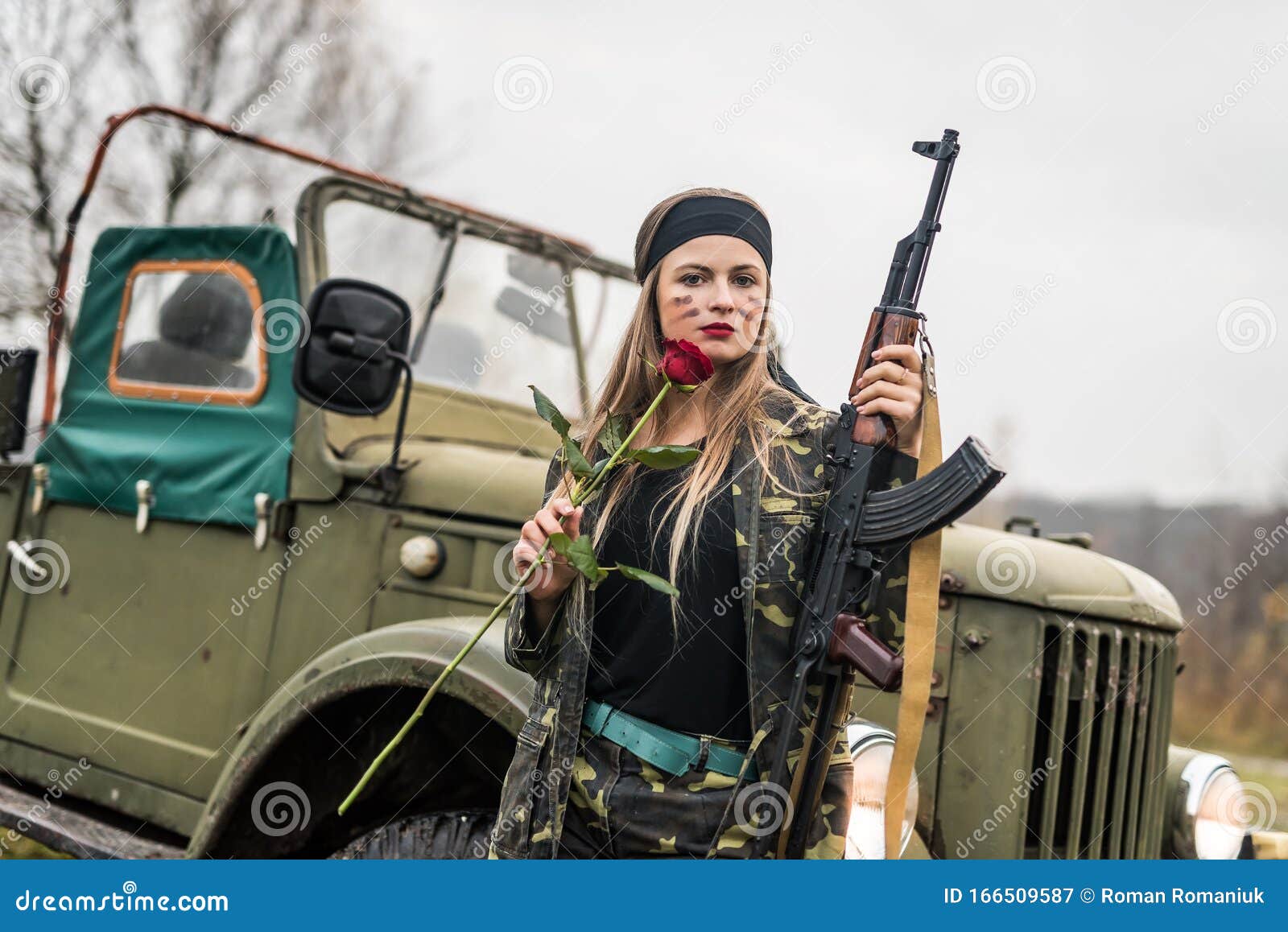 Rifle With A Flower In The Barrel Stock Photo | CartoonDealer.com #31781046