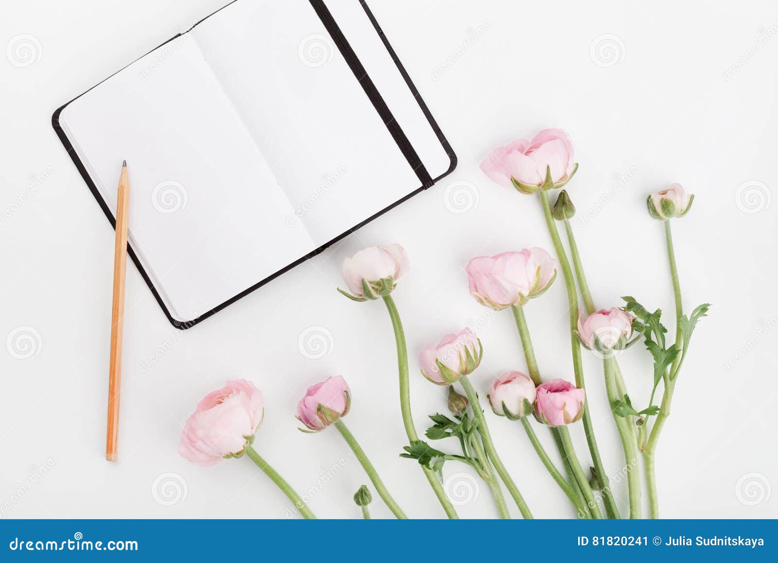 Beautiful Spring Ranunculus Flowers and Empty Notebook on White Table ...