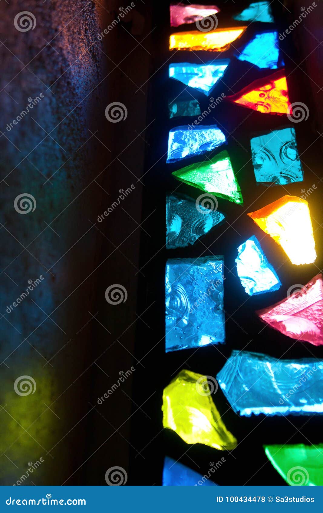 Stained Glass Window Casting Light on Wall Stock Photo - Image of ...