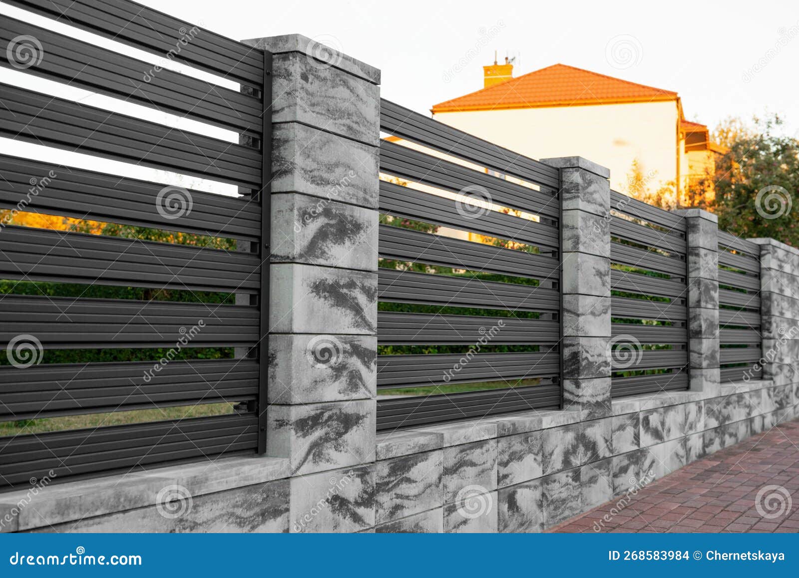 Beautiful Stone Fence with Iron Railing Near Pathway Outdoors Stock ...