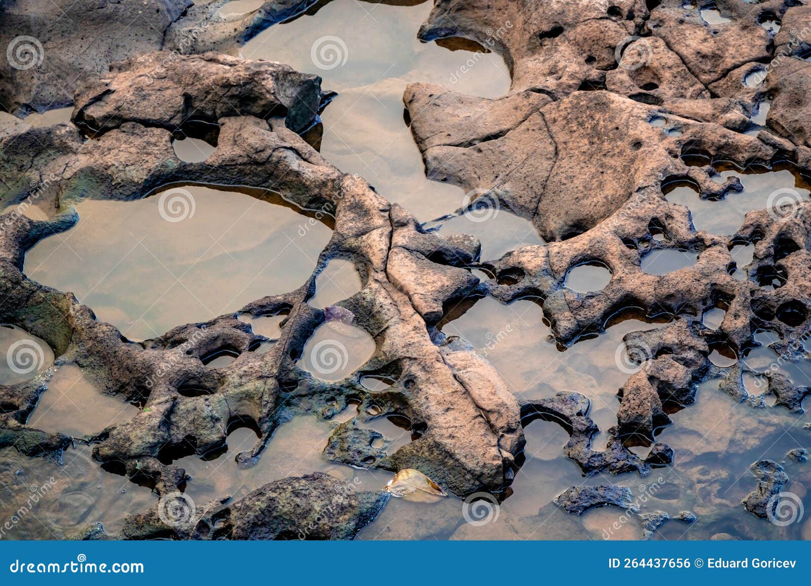 A Beautiful Stone Structure with Gaps Filled with Water. Wallpaper ...
