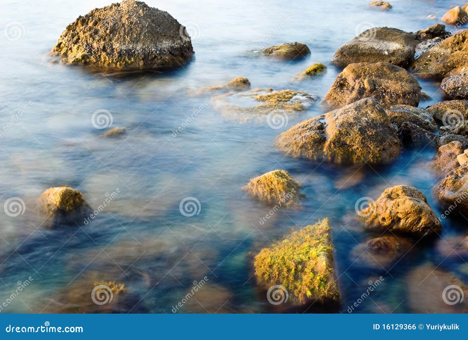 Beautiful stones in a sea stock photo. Image of dawn - 16129366