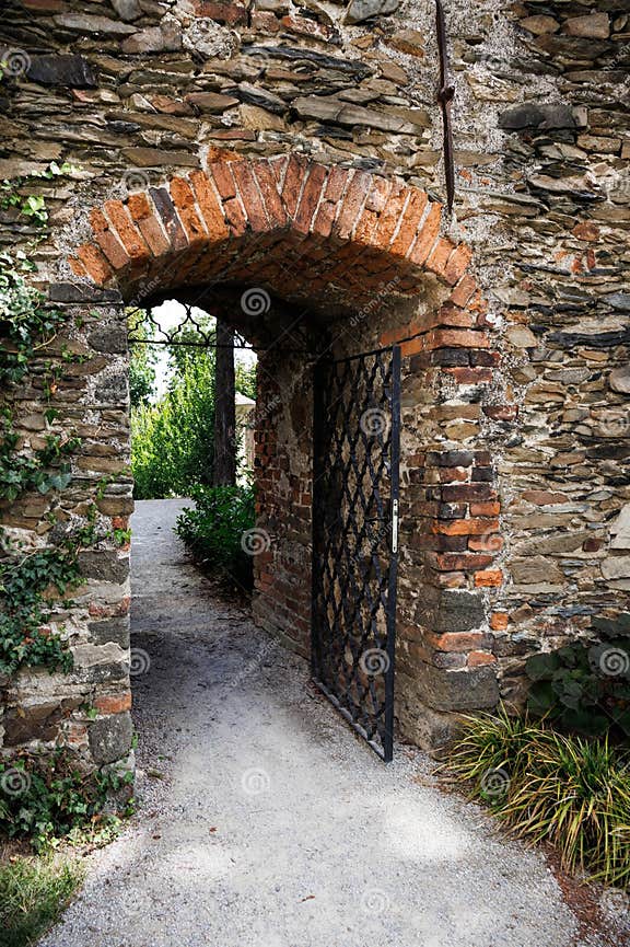 Beautiful Stonewall with Iron Gate in Bruntal Castle Garden. Stock Image - Image of path, stone ...