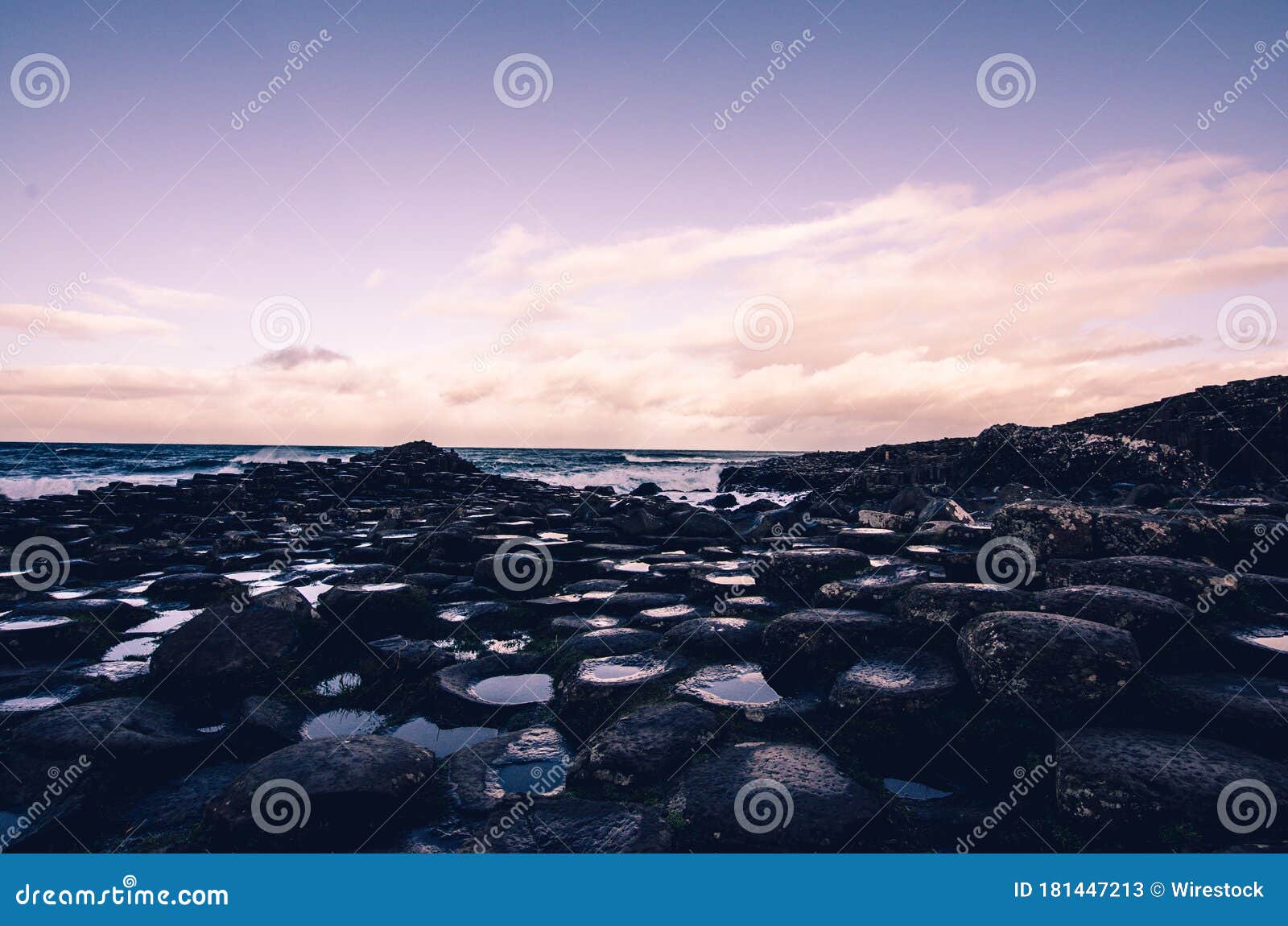 Beautiful and Strange Rocks on the Beach with the Reflection of the Sky ...