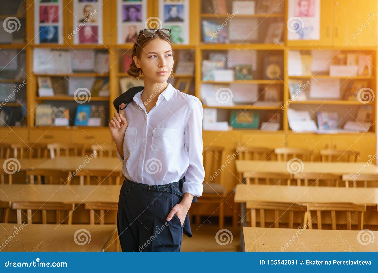 A Beautiful Student Stands in the Classroom Stock Image - Image of ...