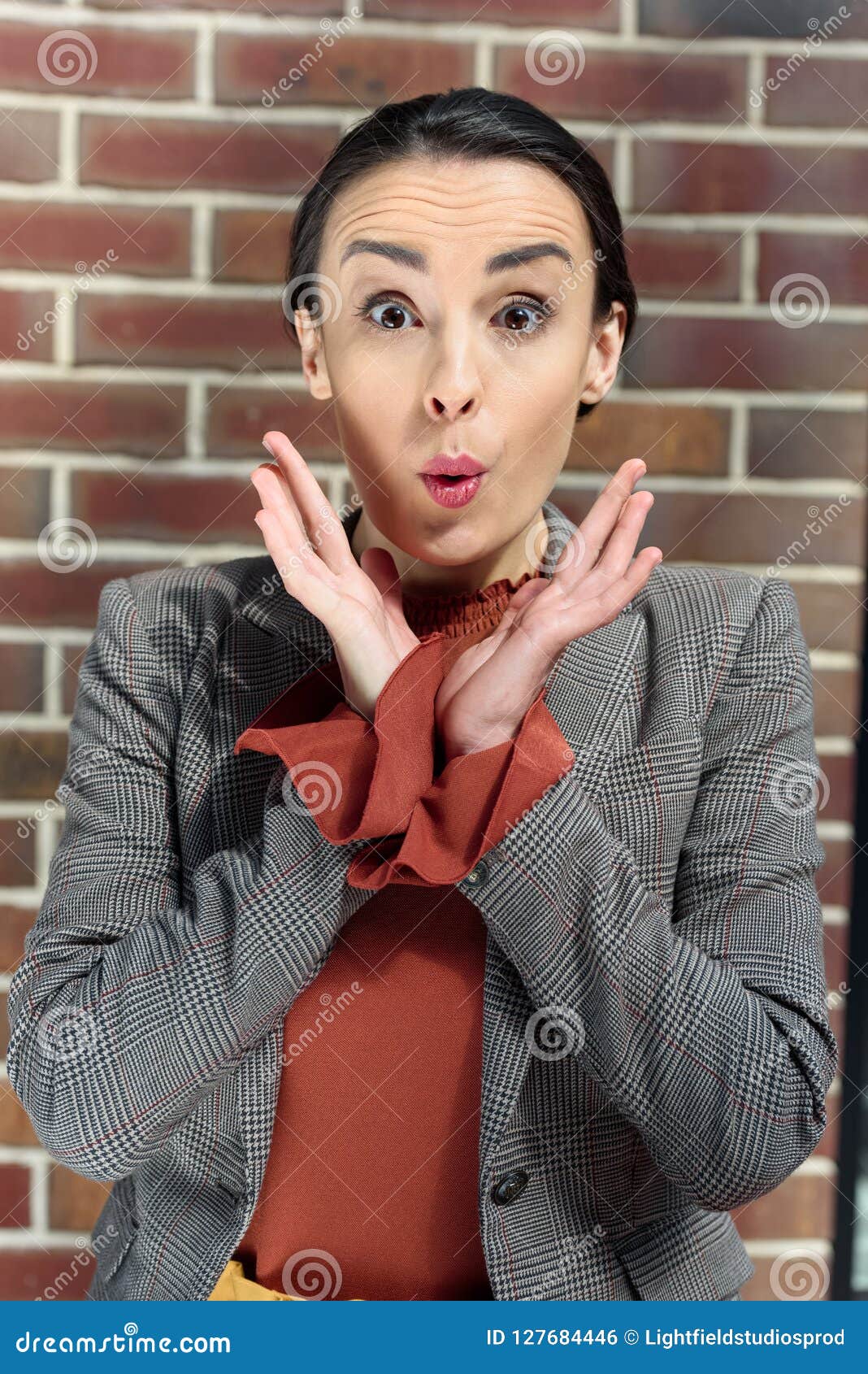 Beautiful Stylish Woman Grimacing and Looking Stock Photo - Image of ...