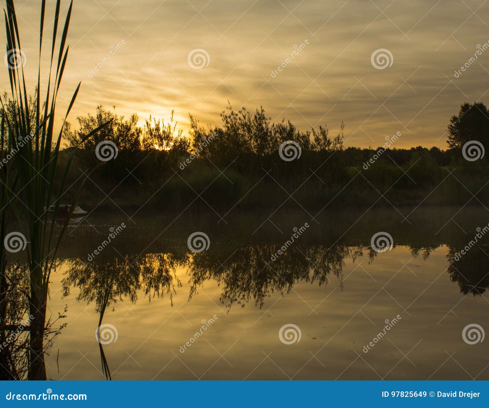 Beautiful Sun Rise with Water Reflections of the Sun Stock Image ...