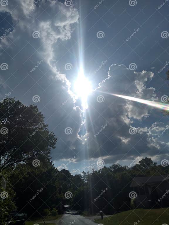 Beautiful Sun Splitting the Clouds Stock Image - Image of tree, cloud ...