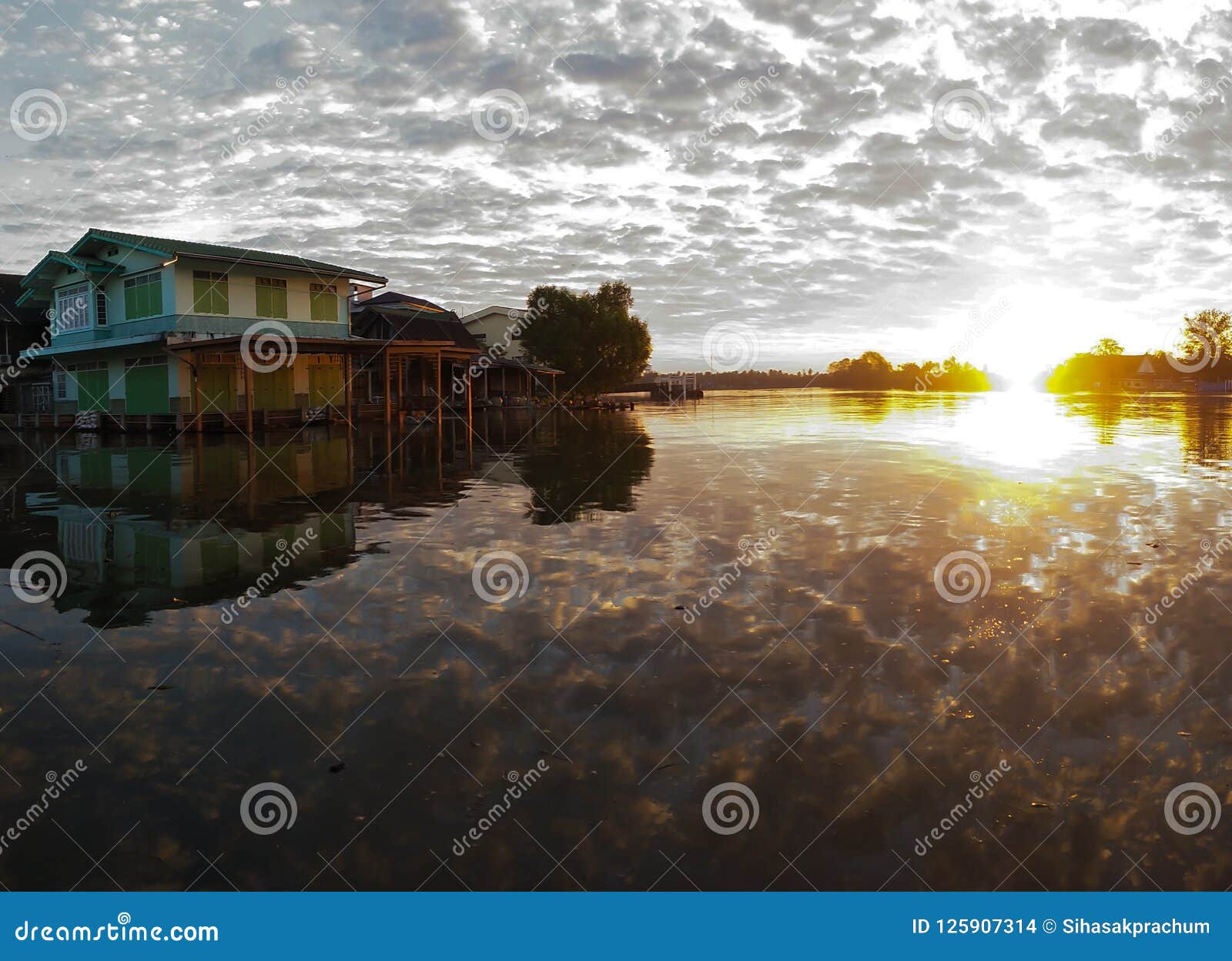 Sunrise with Clouds and Blue Sky Reflection on the River Stock Photo ...