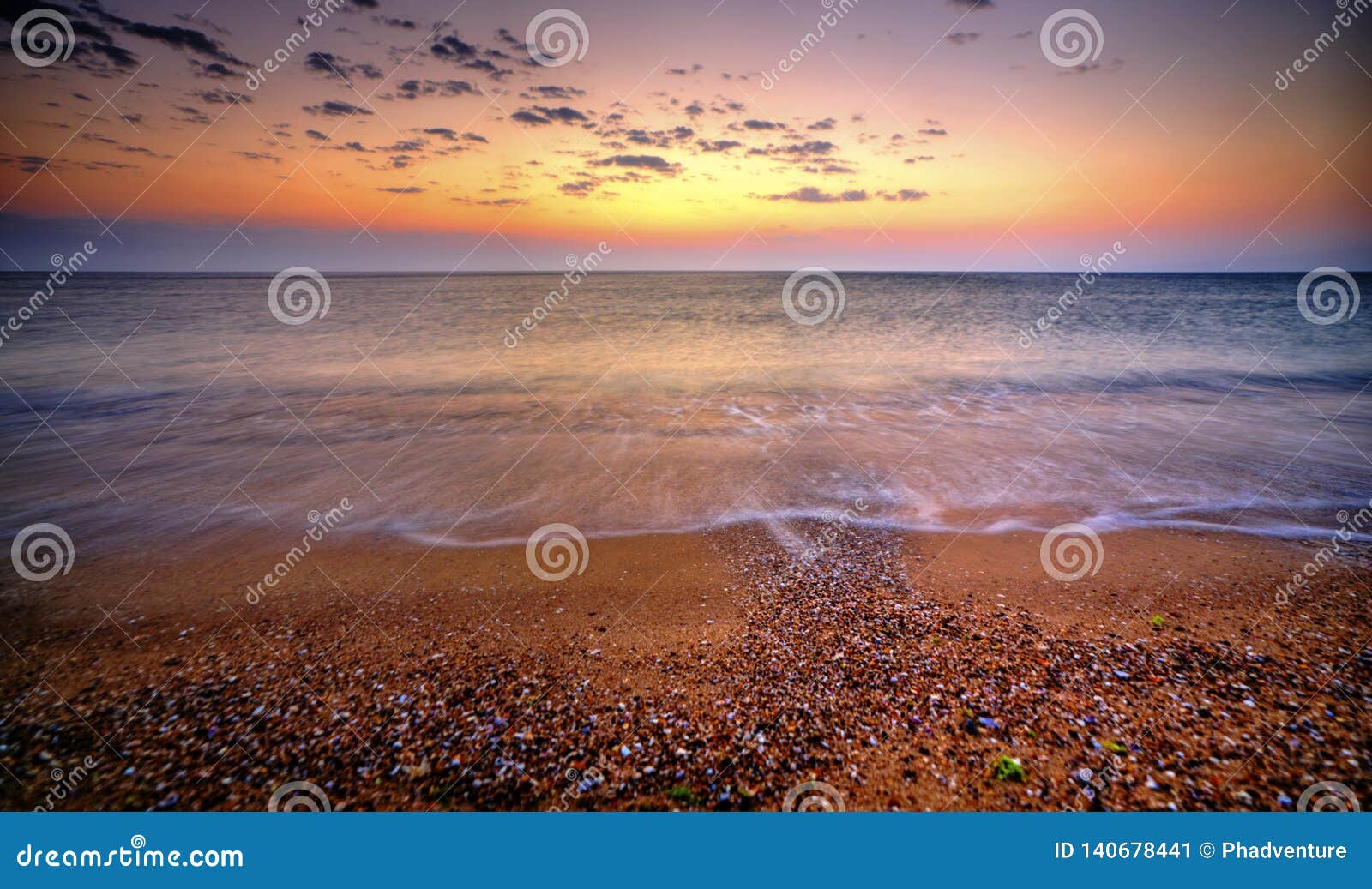 Sunrise over the beach stock image. Image of light, landscape - 140678441
