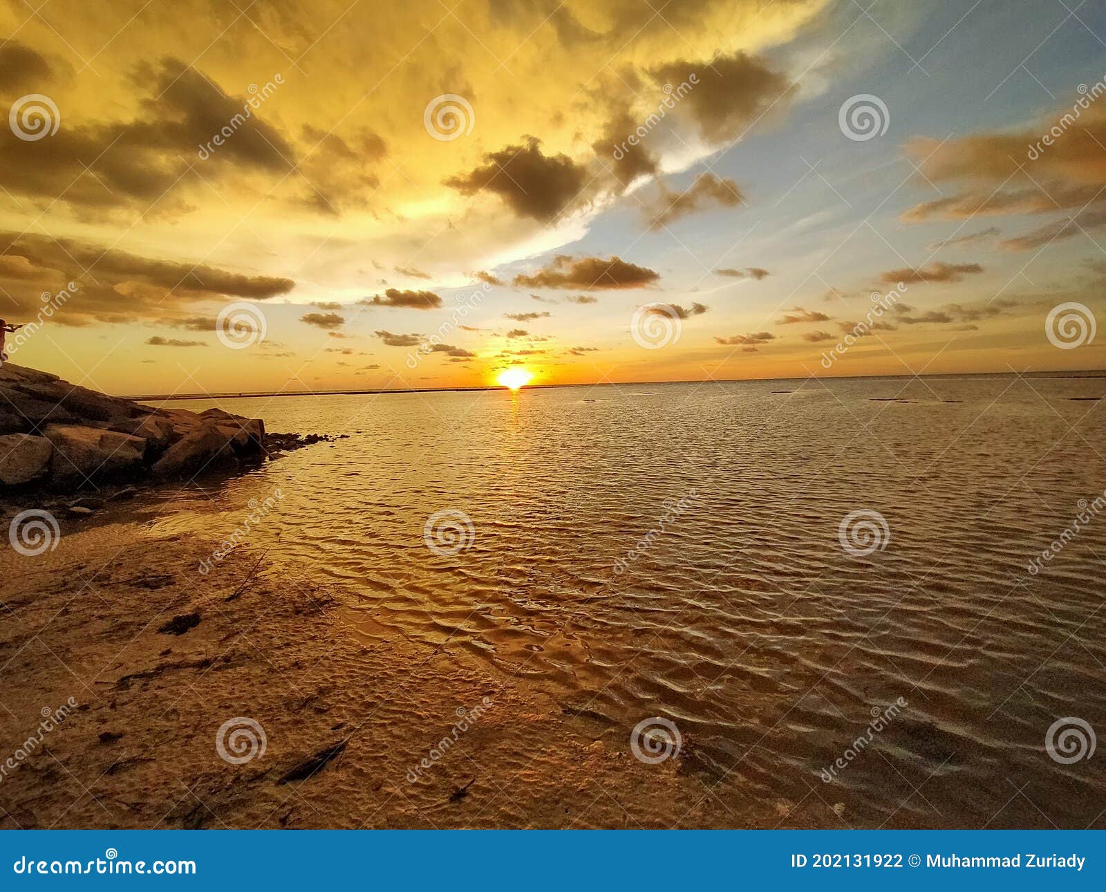 Beautiful sunset at beach stock photo. Image of beautiful - 202131922