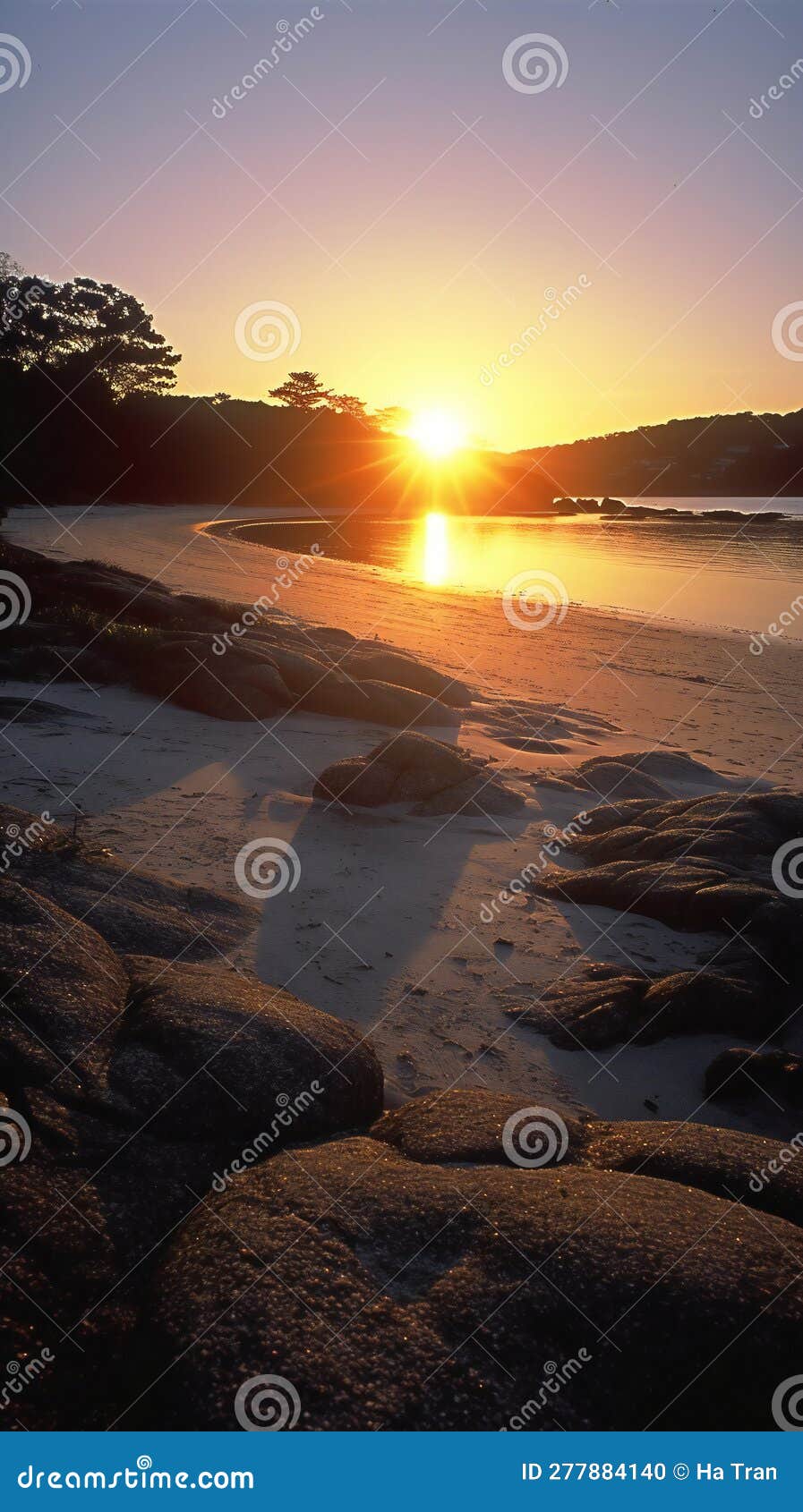 Beautiful Sunset at the Beach with Rocks and Sunbeams Stock ...