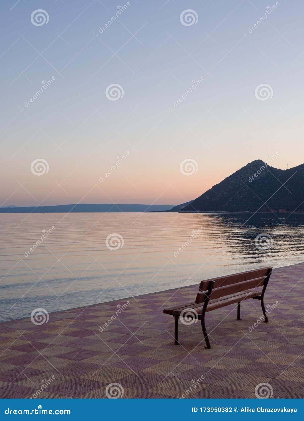 Beautiful Sunset and Bench on the Seafront in Greece Stock Photo ...