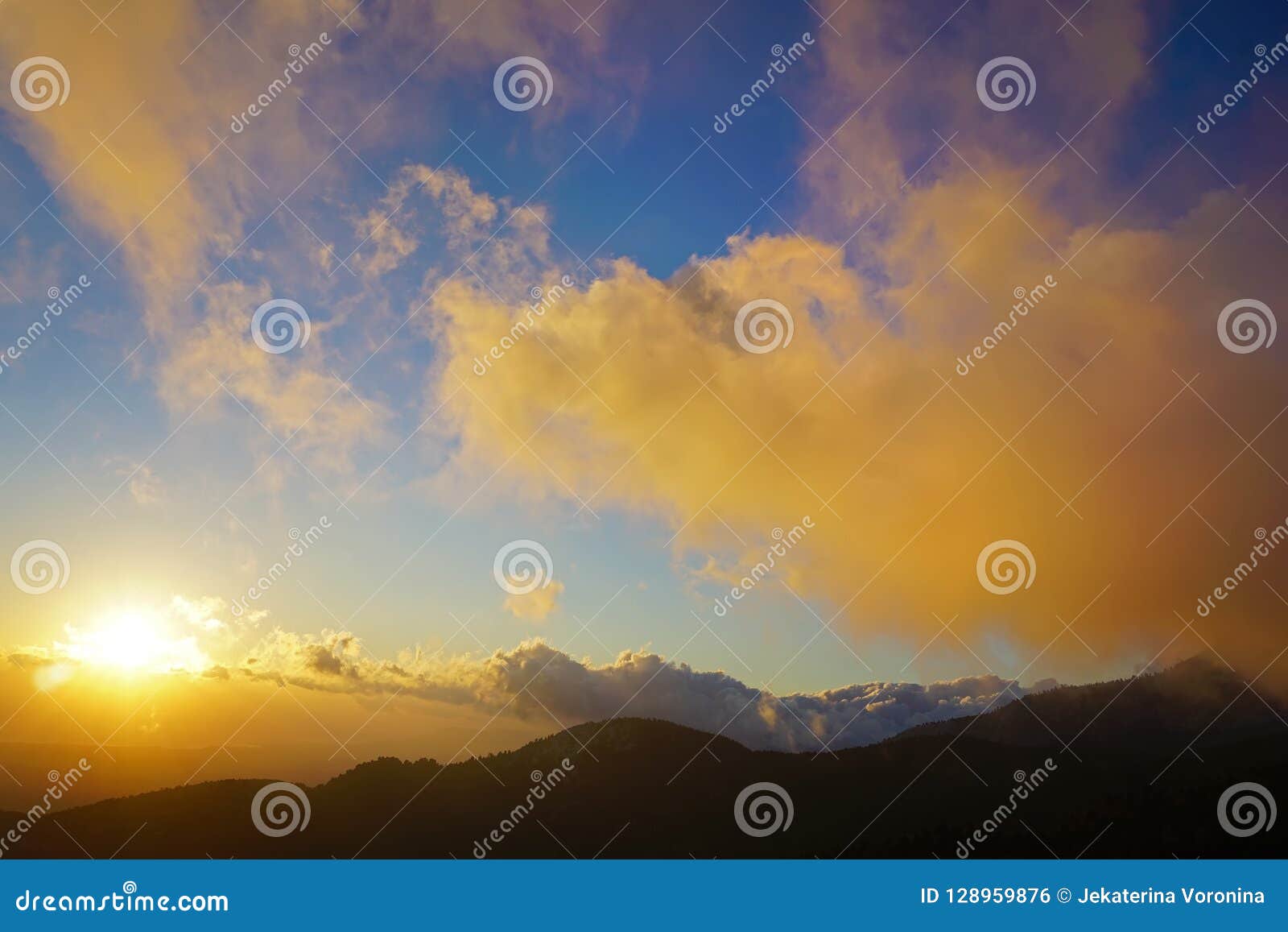 Beautiful Sunset with Clouds Over the Mountains Stock Photo - Image of ...