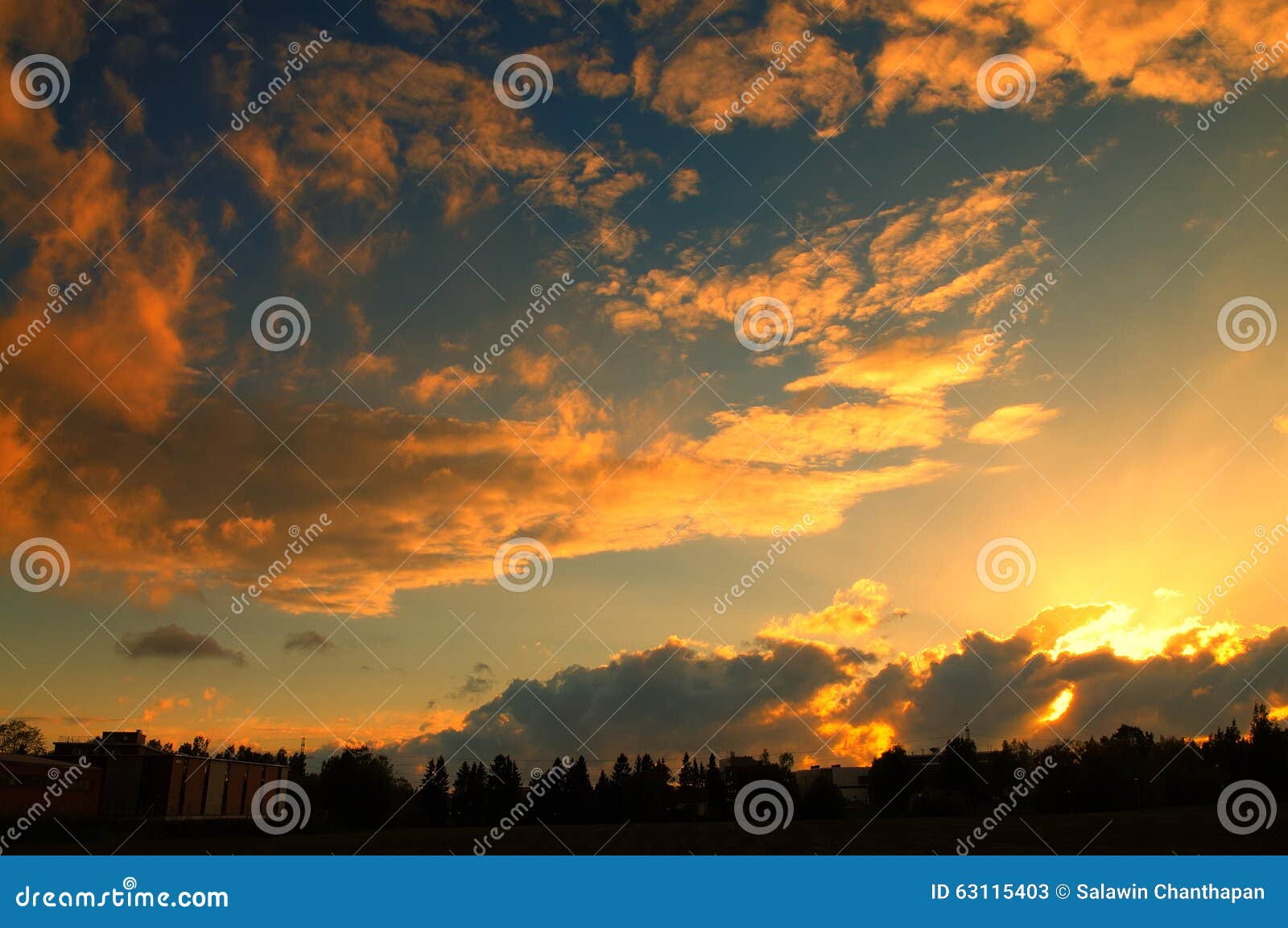 Beautiful Sunset on a Cloudy Day Stock Image - Image of dusk, land ...