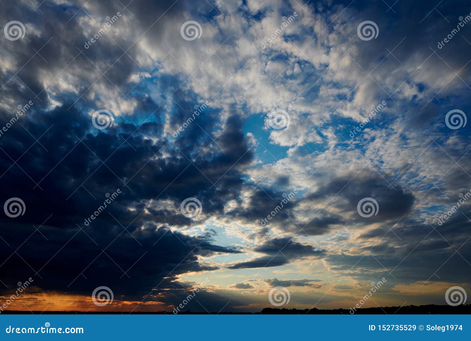 Beautiful Sunset - Dark Sky with Clouds and Sunlight Stock Image ...