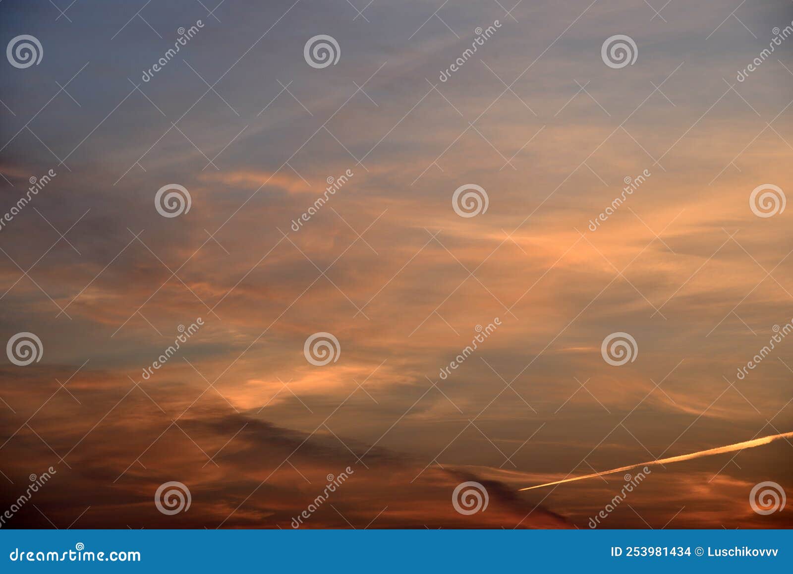 Beautiful Sunset Light and Clouds and a Trace of the Plane. Evening ...