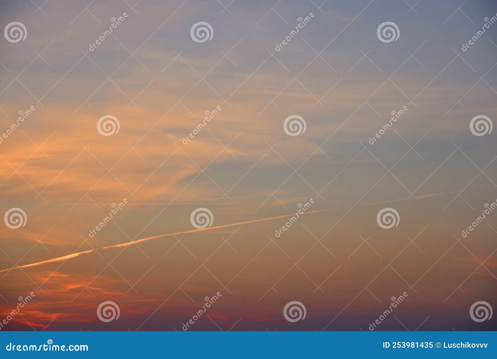 Beautiful Sunset Light and Clouds and a Trace of the Plane. Evening ...