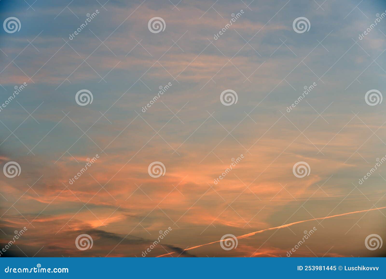 Beautiful Sunset Light and Clouds and a Trace of the Plane. Evening ...