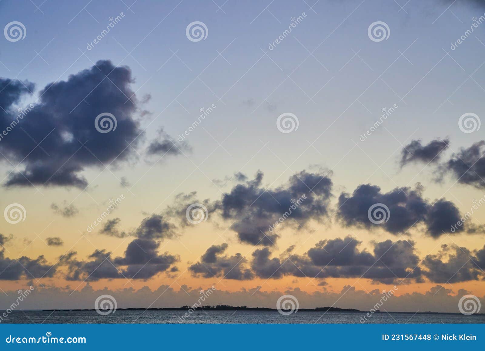 Beautiful Sunset on the Ocean with Muted Colors Stock Photo - Image of ...